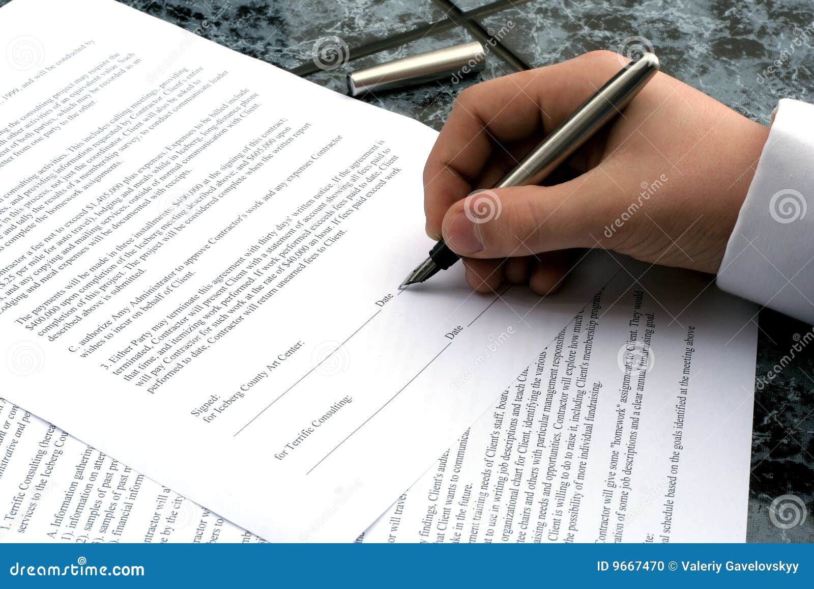Man S Hand Holding a Pen Writing a Signature Stock Photo - Image of ...