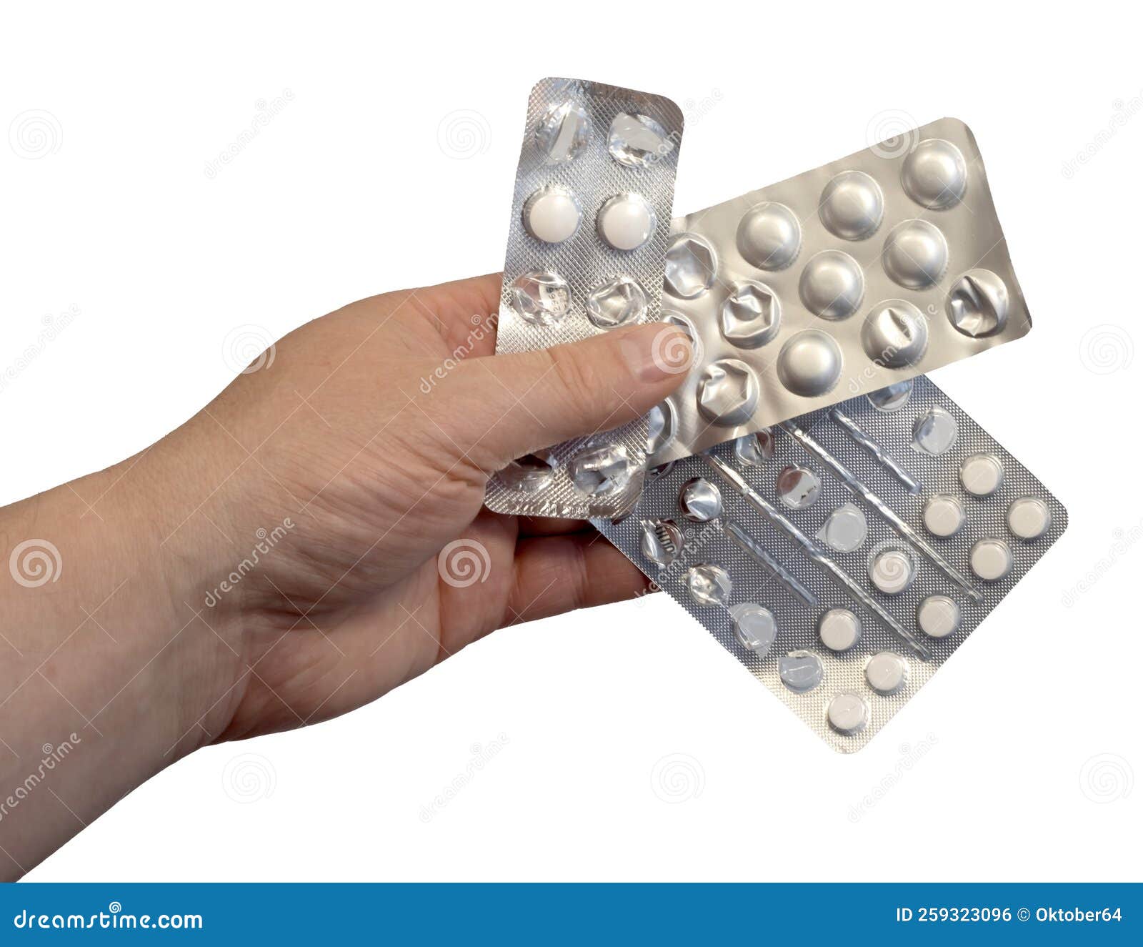 A Man& X27;s Hand Holding Pills in a Blister. There are Several Tablets ...