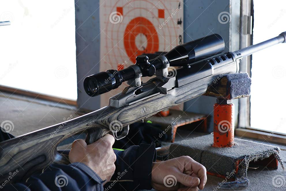 Man s hand holding rifle stock photo. Image of shoulder - 8260712