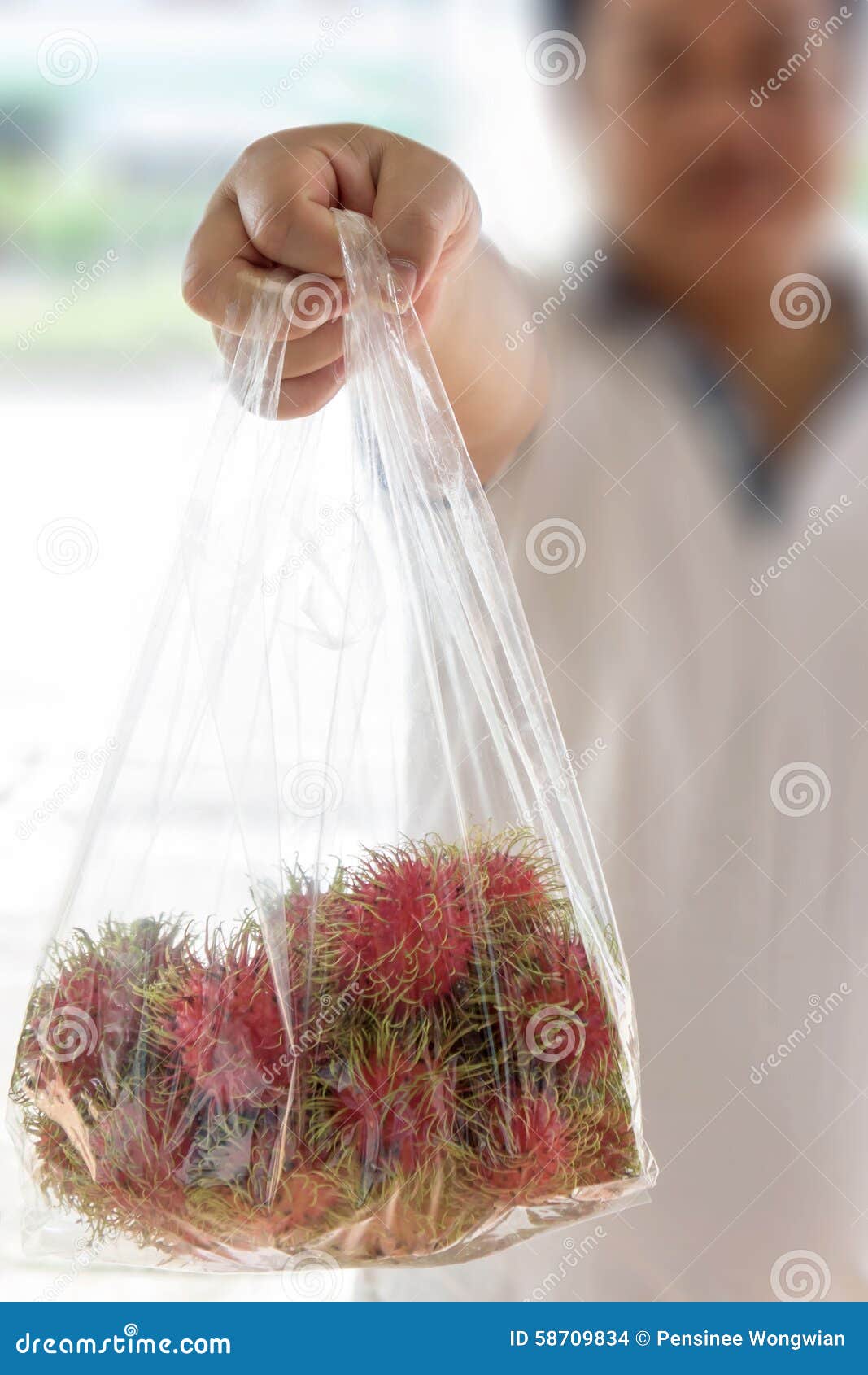 Man s hand holds rambutan stock photo. Image of plant - 58709834