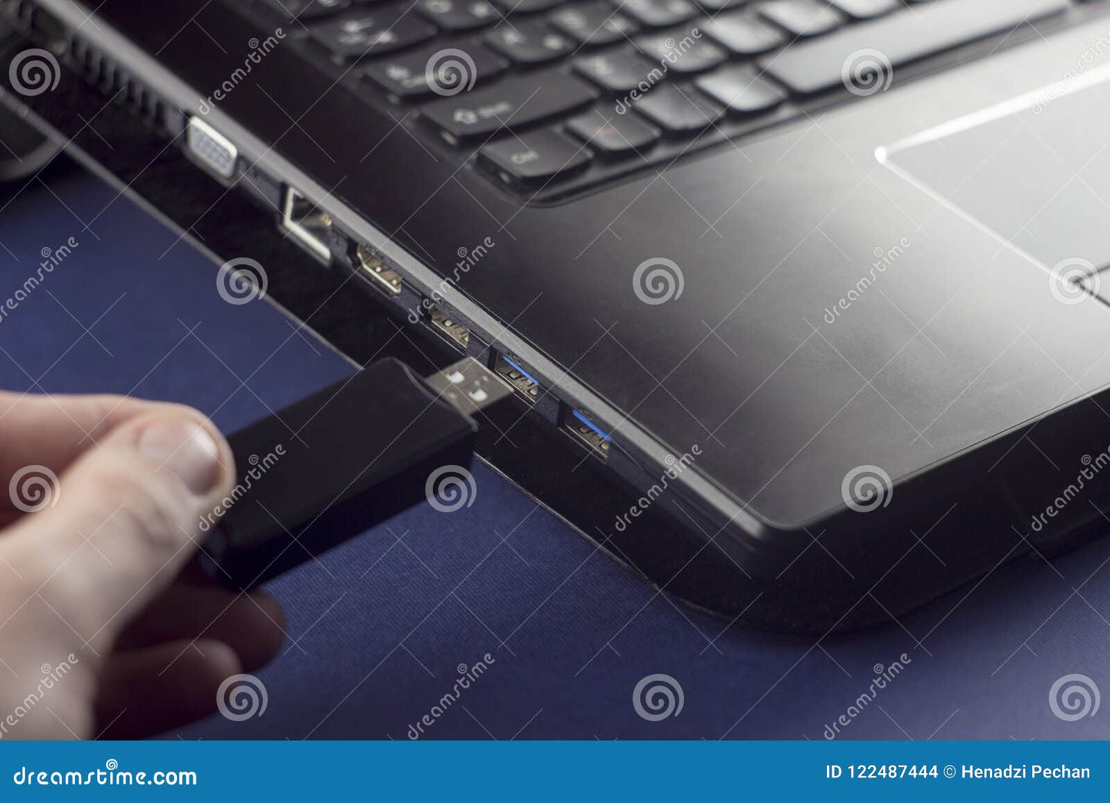 A Man`s Hand Inserts a USB Flash Drive into a Laptop Usb Stock Photo ...