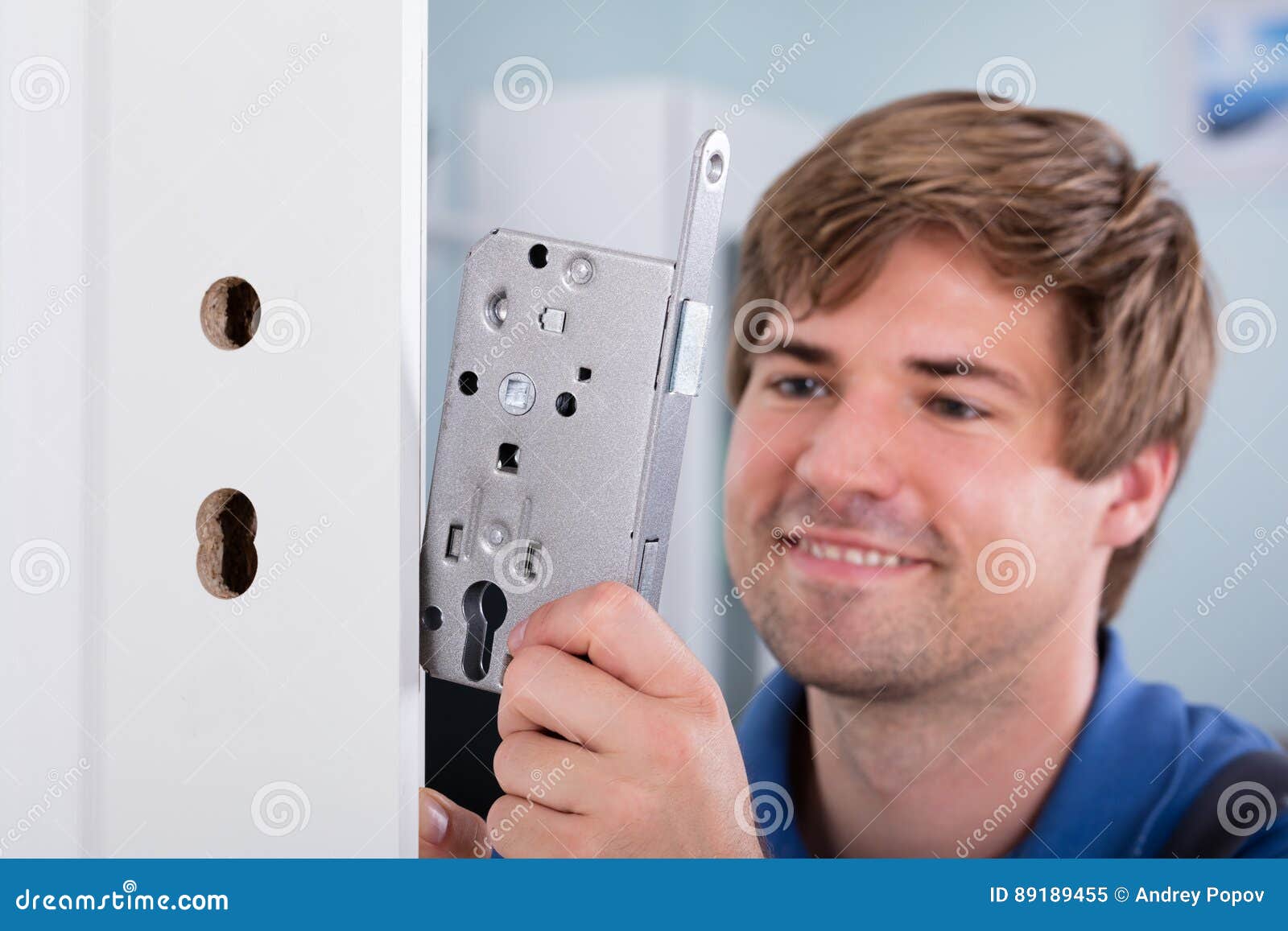 Man`s Hand Installing Door Lock in Door Stock Image - Image of door ...