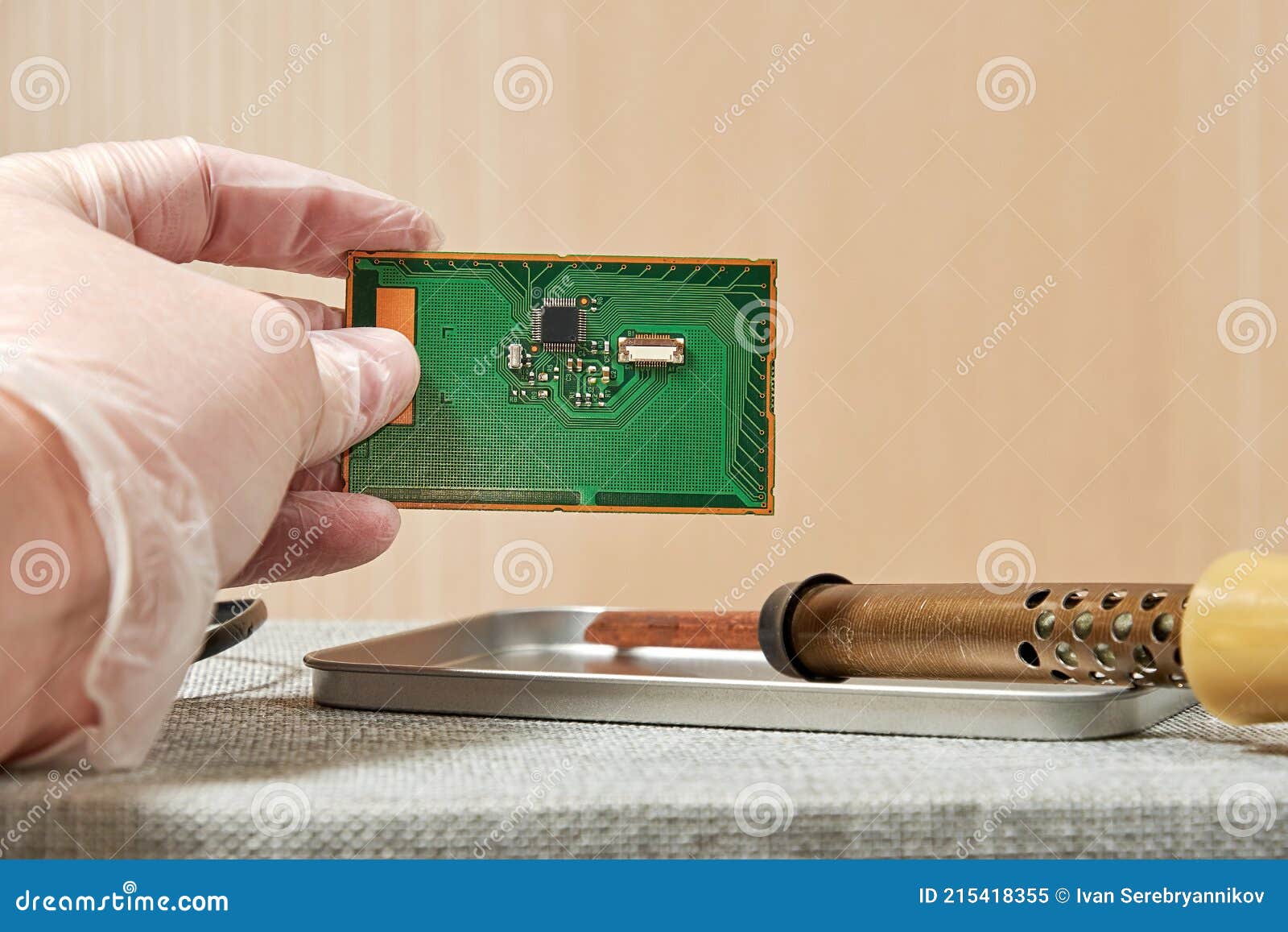 Man& X27;s Hand Keeps a PCB with a Chip in the Laboratory Above the ...