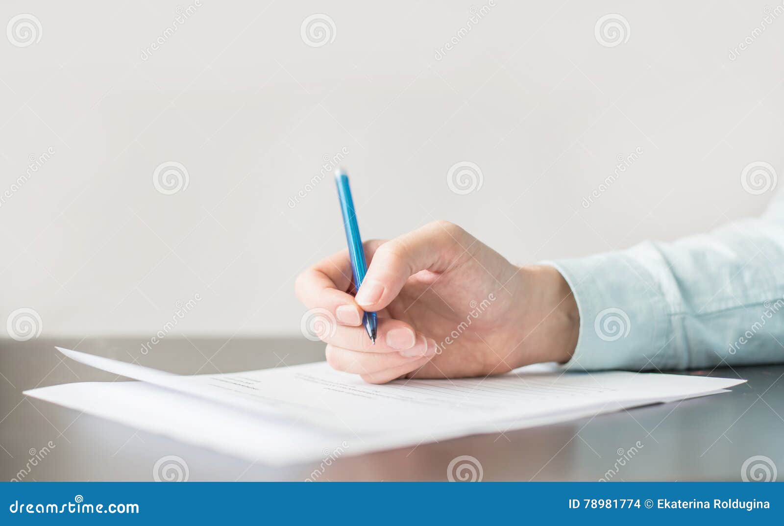 Man S Hand with a Pen and Piece of Paper Stock Photo - Image of offer ...