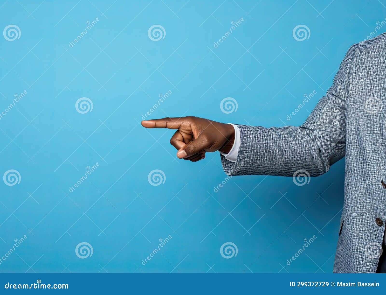 A Man S Hand Pointing at a Blue Wall with an Image of a Space for Text ...