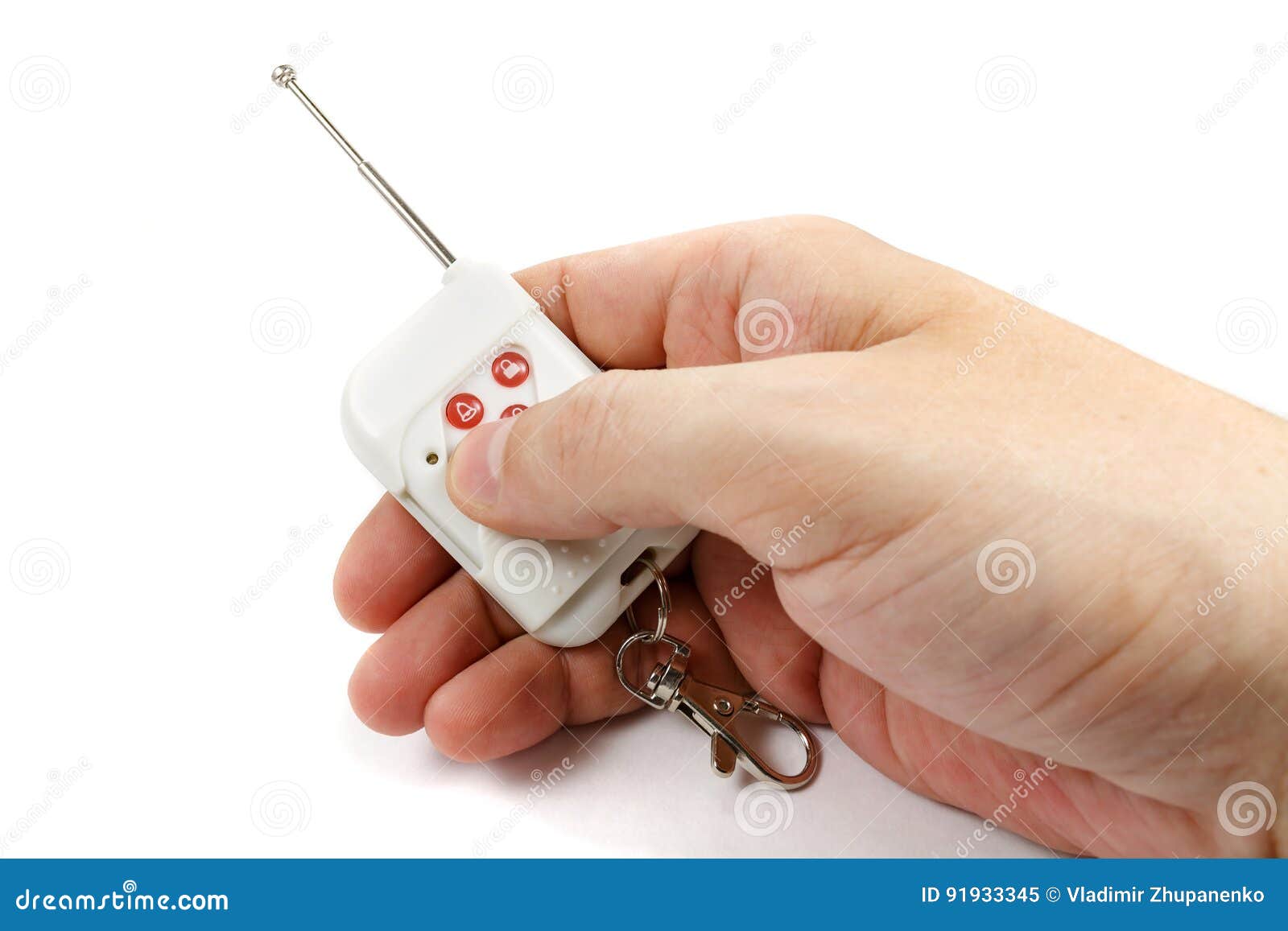Man`s Hand Presses Button on the Security System Remote Control Stock ...