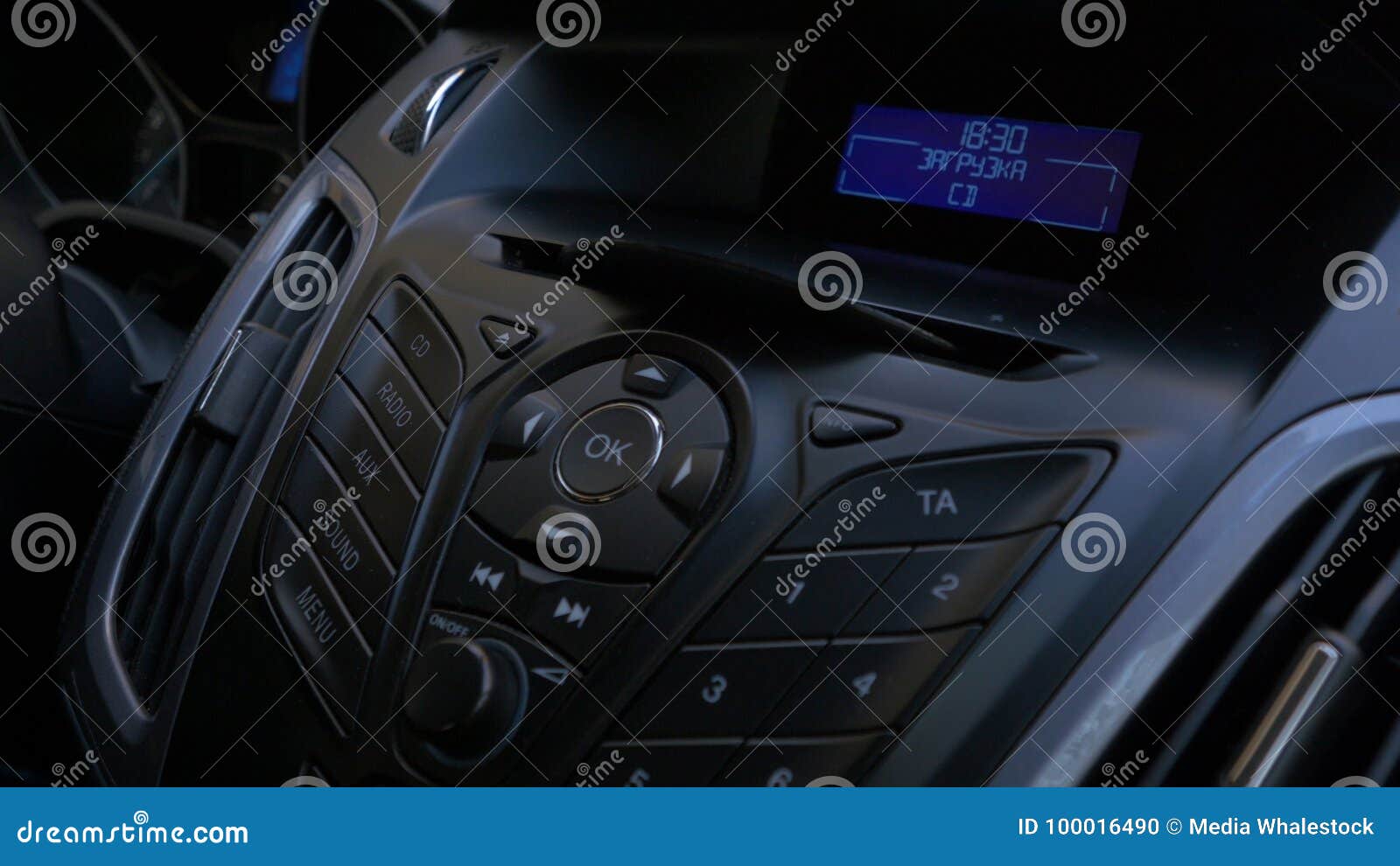 Man`s Hand Puts the Disk into the Car Player. Button Control for ...