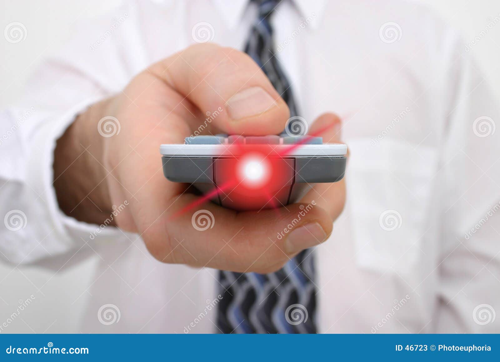 Man S Hand on a Remote Control with Light Beaming from Remote Stock ...