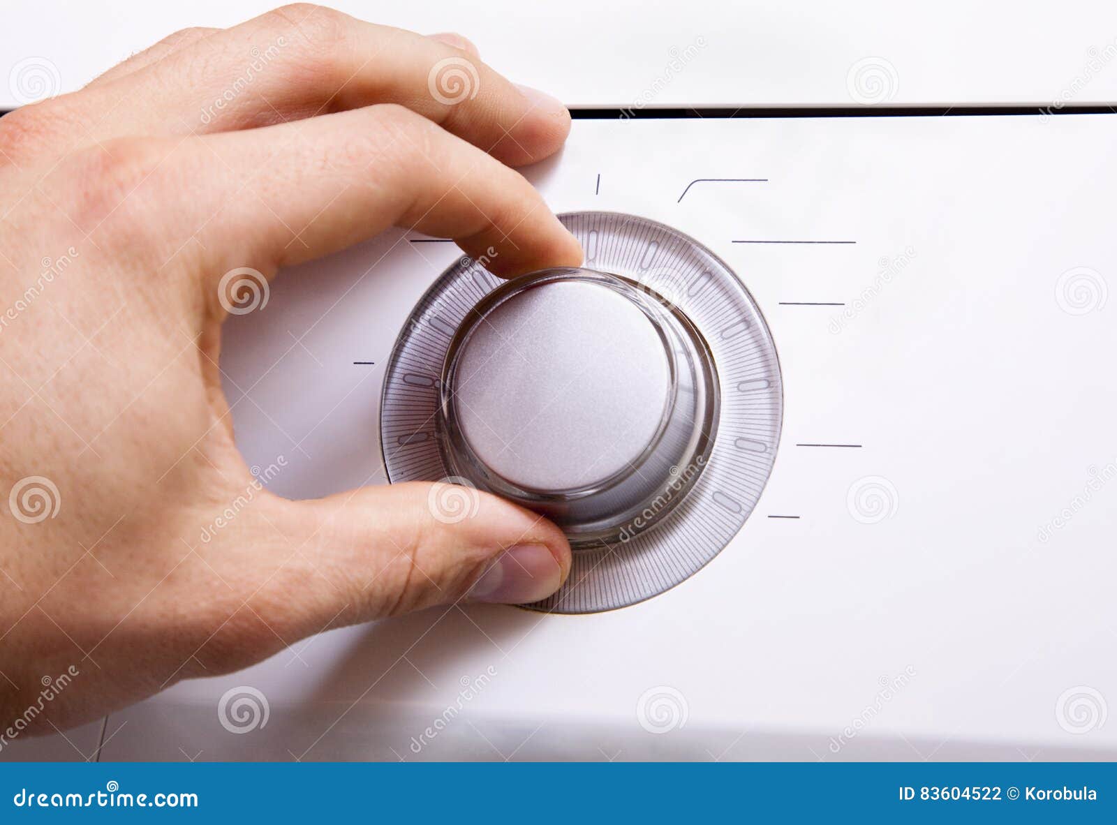 Man`s Hand Sets the Parameters of the Control Button.4. Stock Photo ...