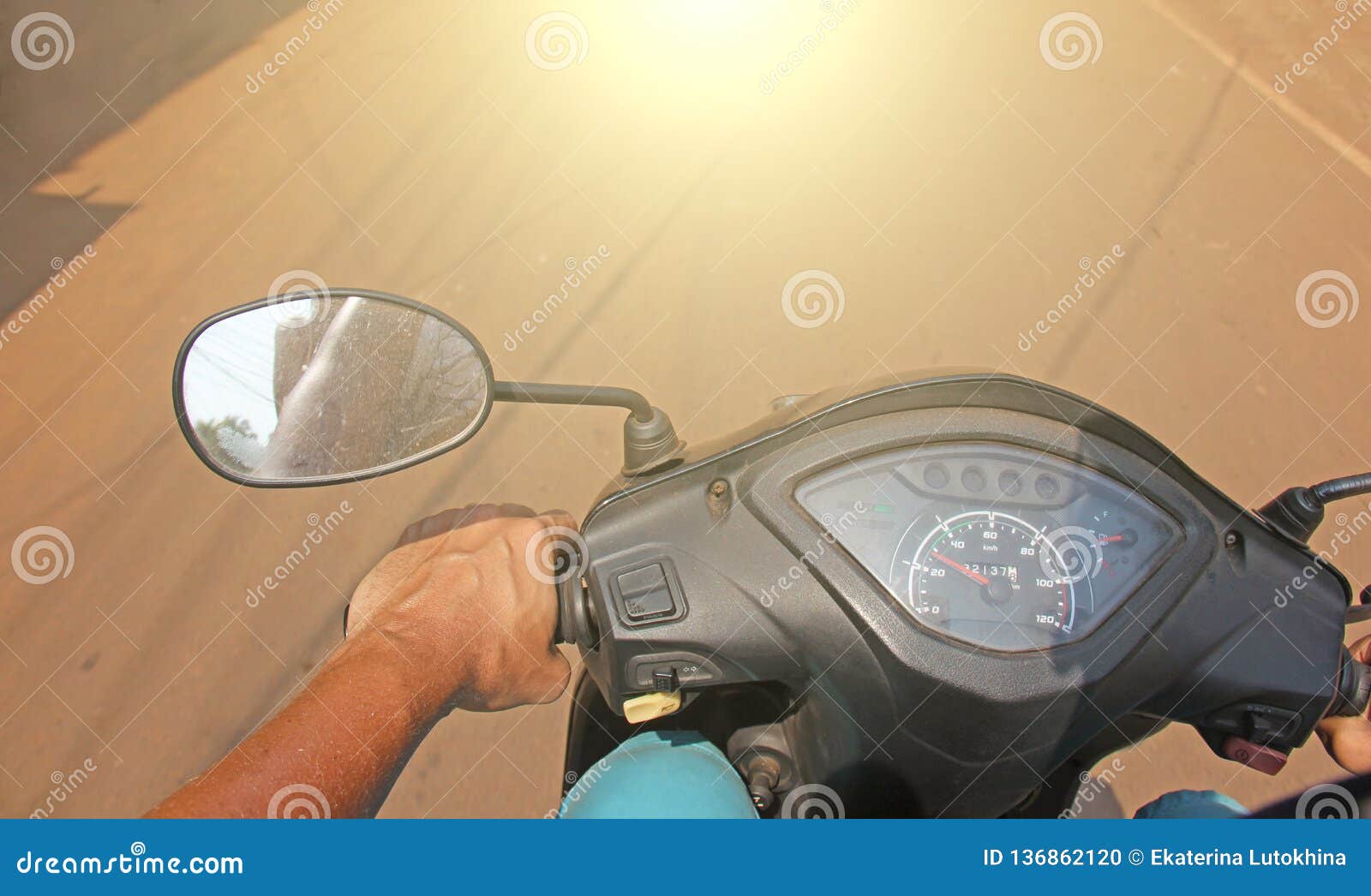 The Man`s Hand and the Speedometer of the Scooter are Close-up Stock ...