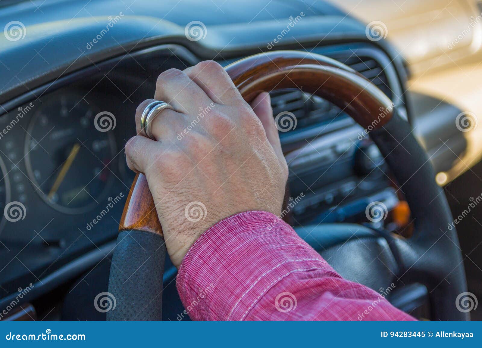 Man`s Hand on the Steering Wheel Inside of a Car Stock Image - Image of ...