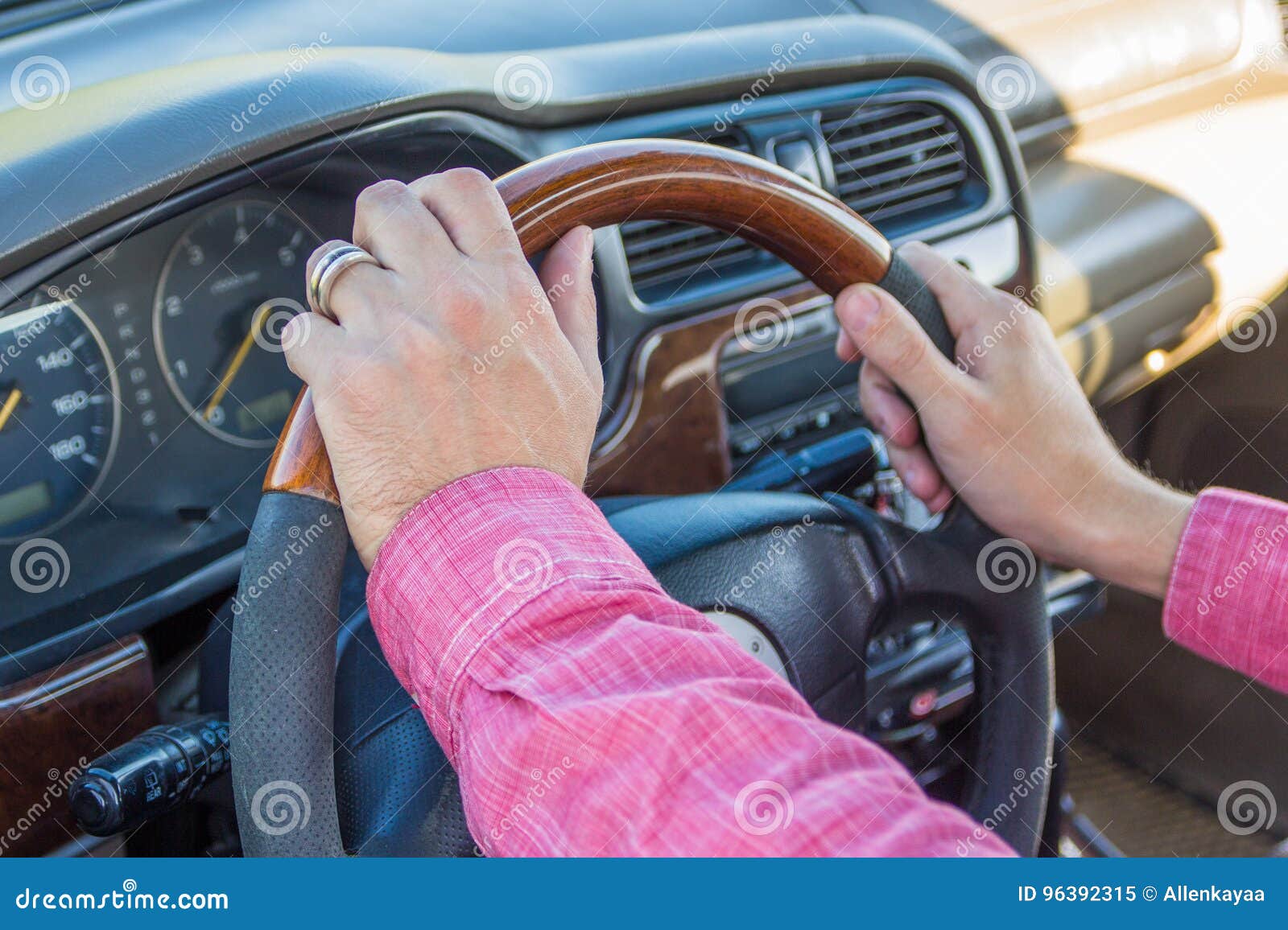 Man`s Hand on the Steering Wheel Inside of a Car Stock Image - Image of ...