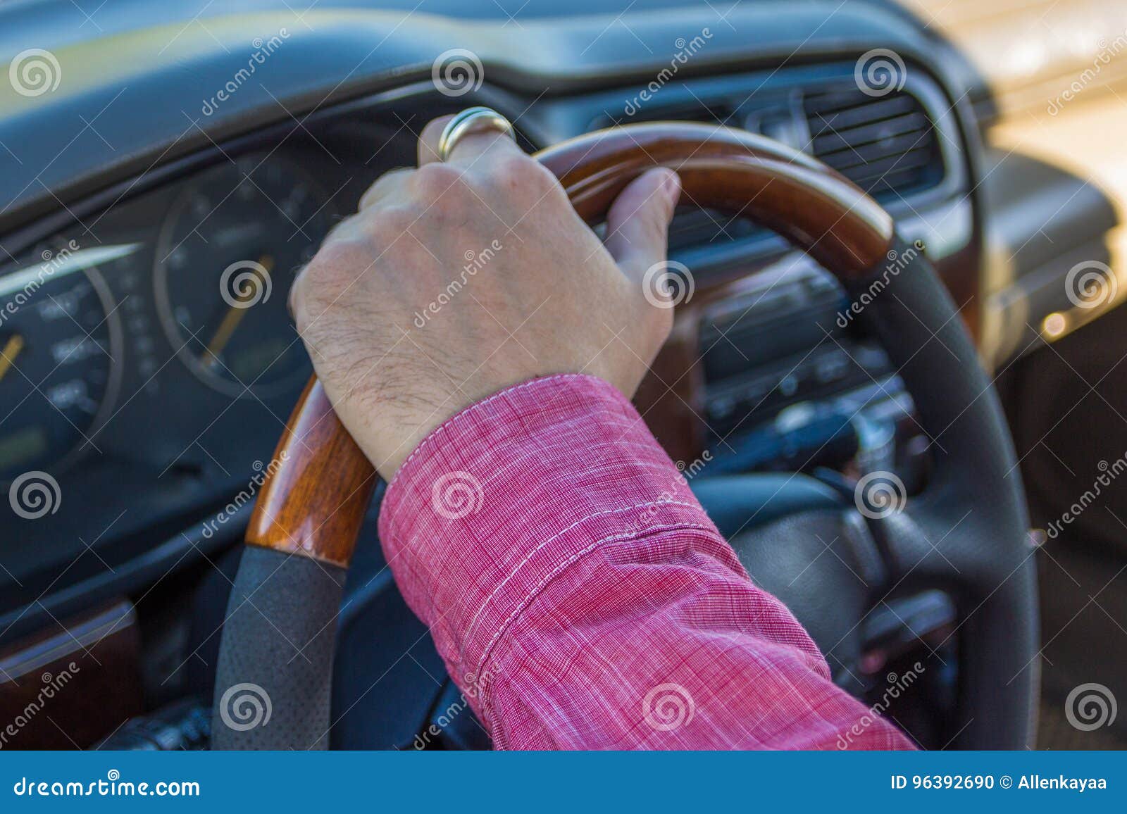 Man`s Hand on the Steering Wheel Inside of a Car Stock Photo - Image of ...