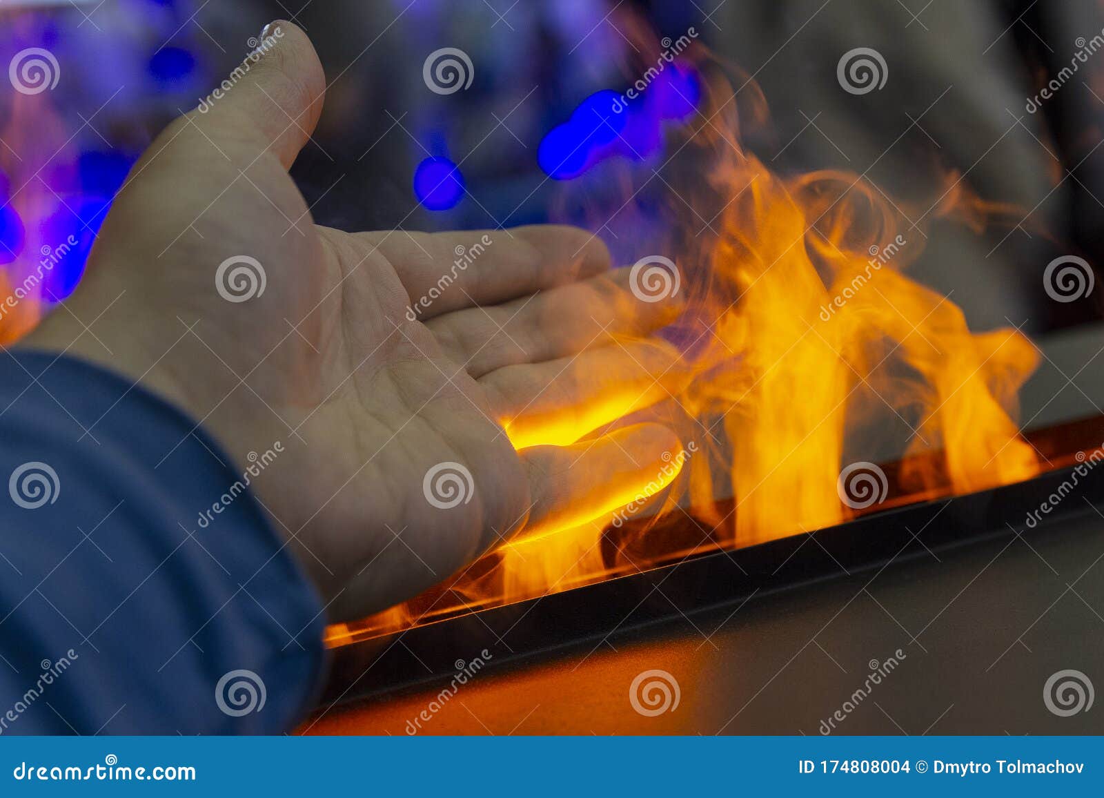 Man`s Hand Touches a Safe Flame Stock Photo - Image of campfire, heat ...