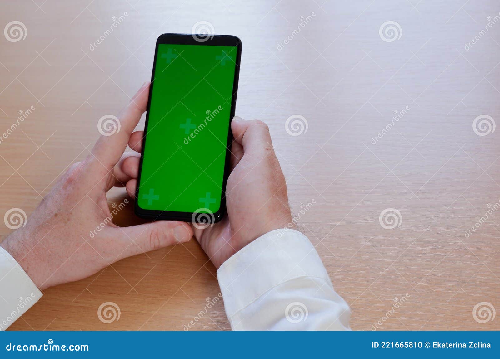 Man`s Hand Using Mobile Smartphone with Green Screen. Stock Photo ...