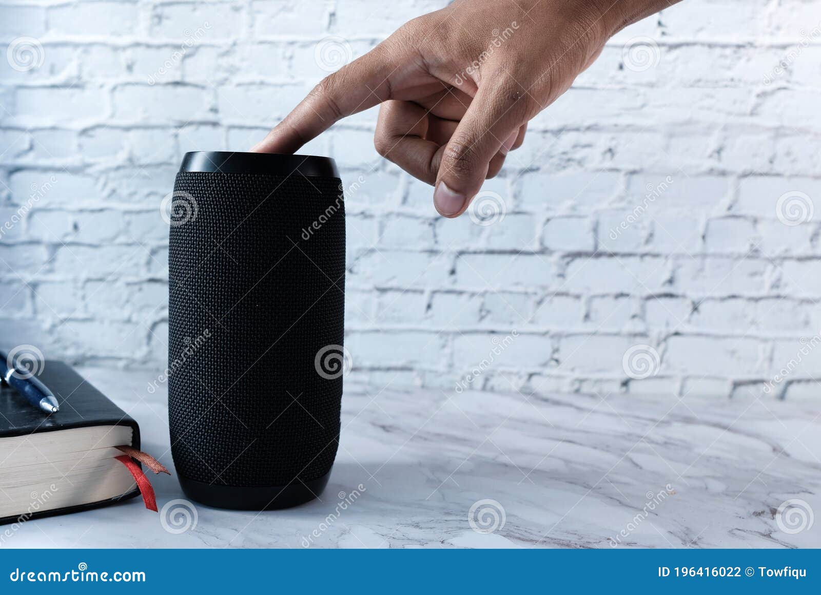 Man`s Hand Using Smart Speaker on Table Stock Photo - Image of speaker ...