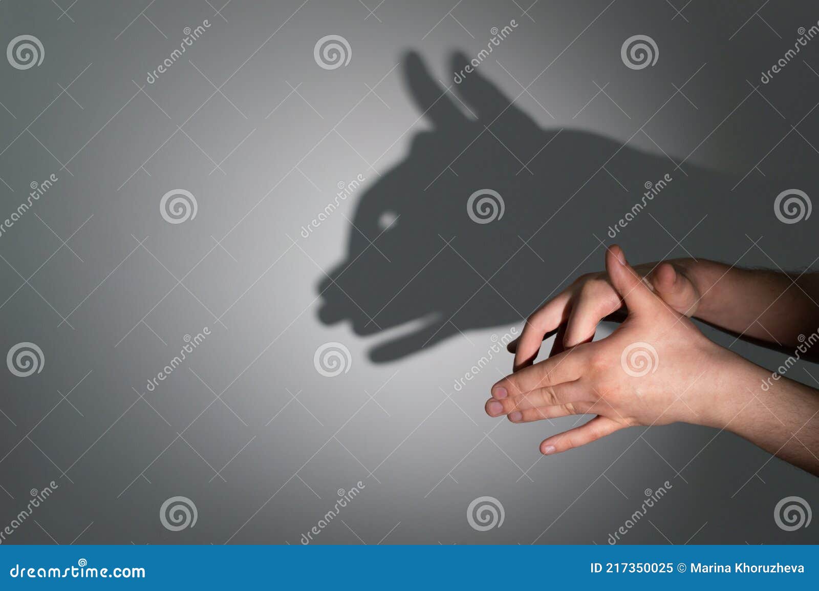 The Man`s Hands Folded in a Gesture Giving Shadow in the Form of a ...