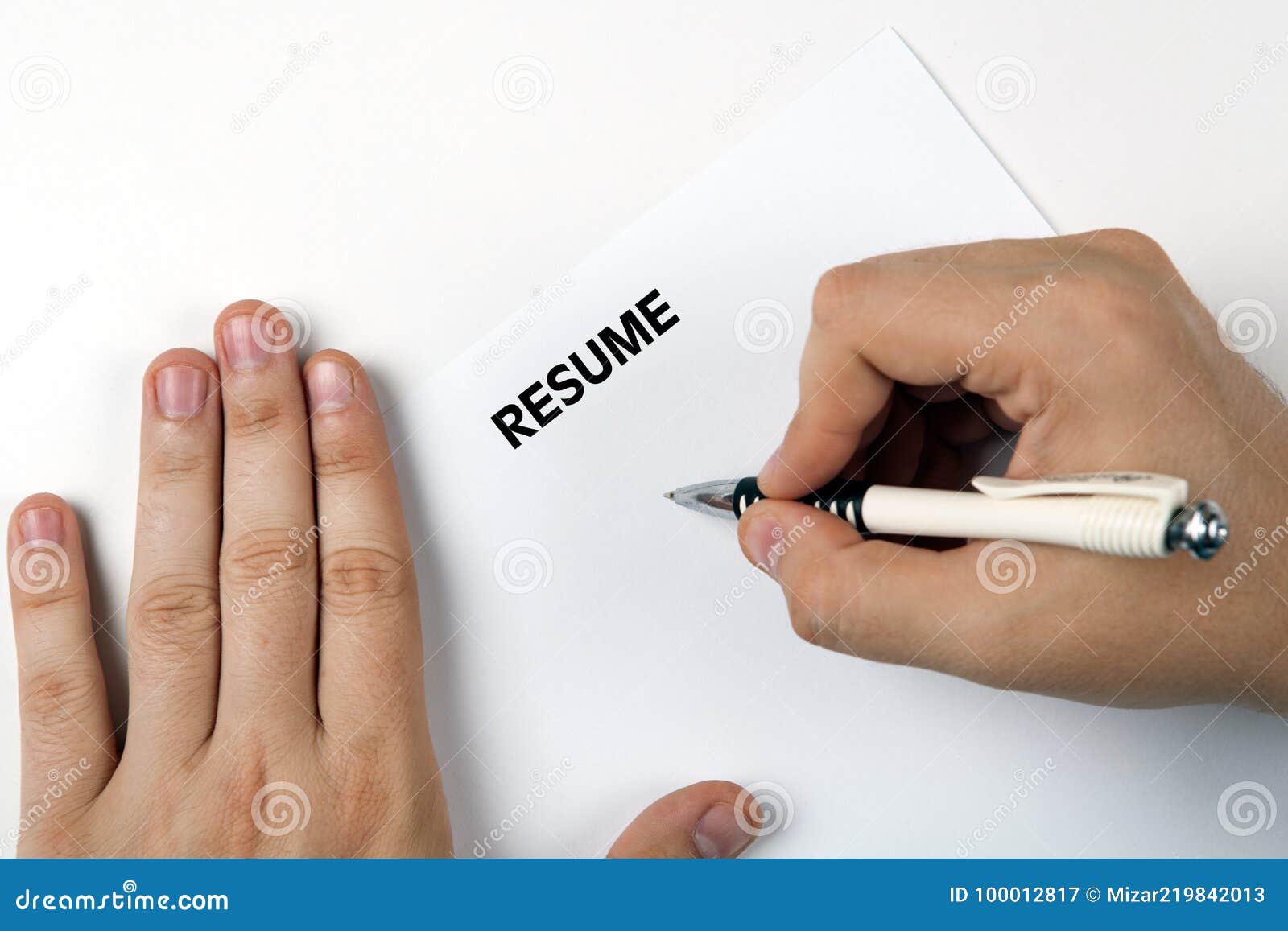 Man`s hands on resume form stock image. Image of hand - 100012817