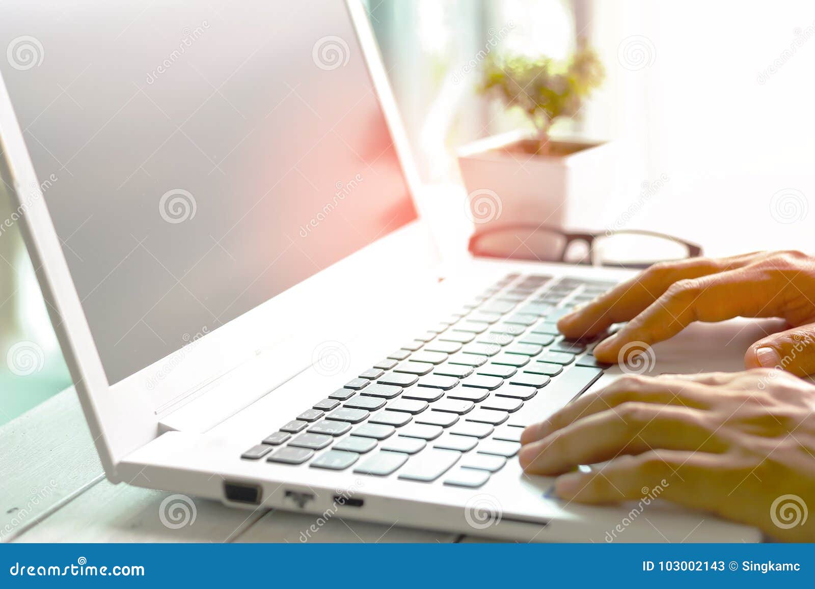 Man`s Hands Using Laptop with Blank Screen on Desk in Home Inter Stock ...