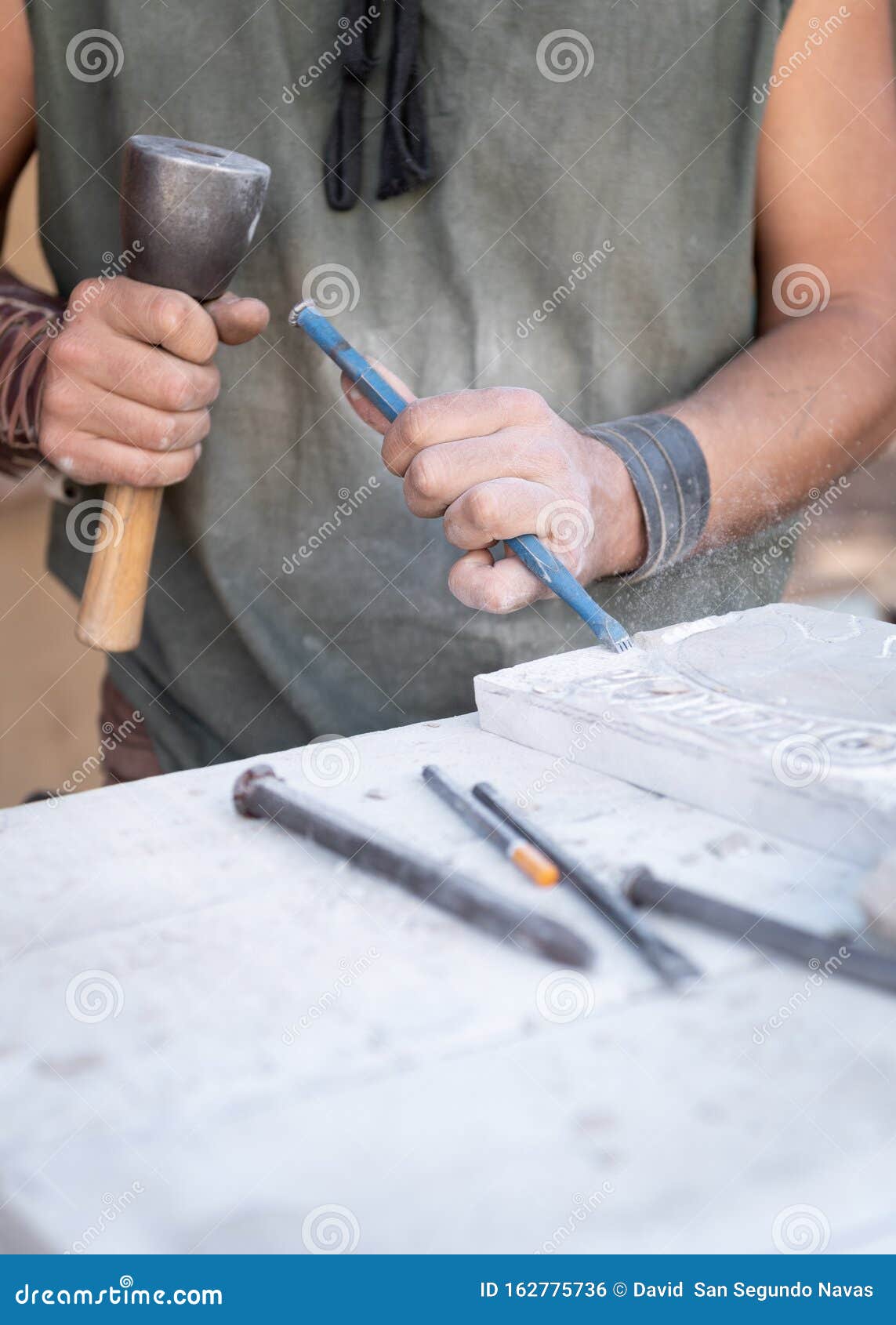 Man`s Hands Working with Hammer and Chisel in Craft Workshop Stock ...