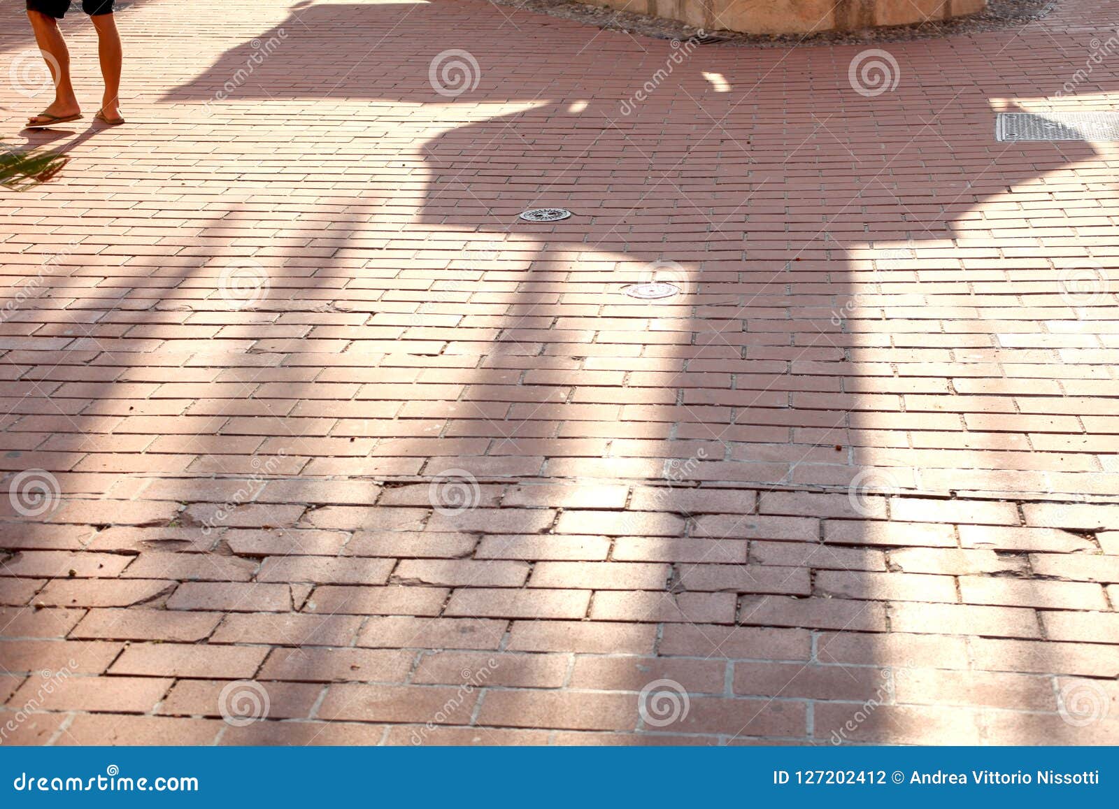 Man`s Legs Walking on a Floor Tiles Pavement Stock Photo - Image of ...