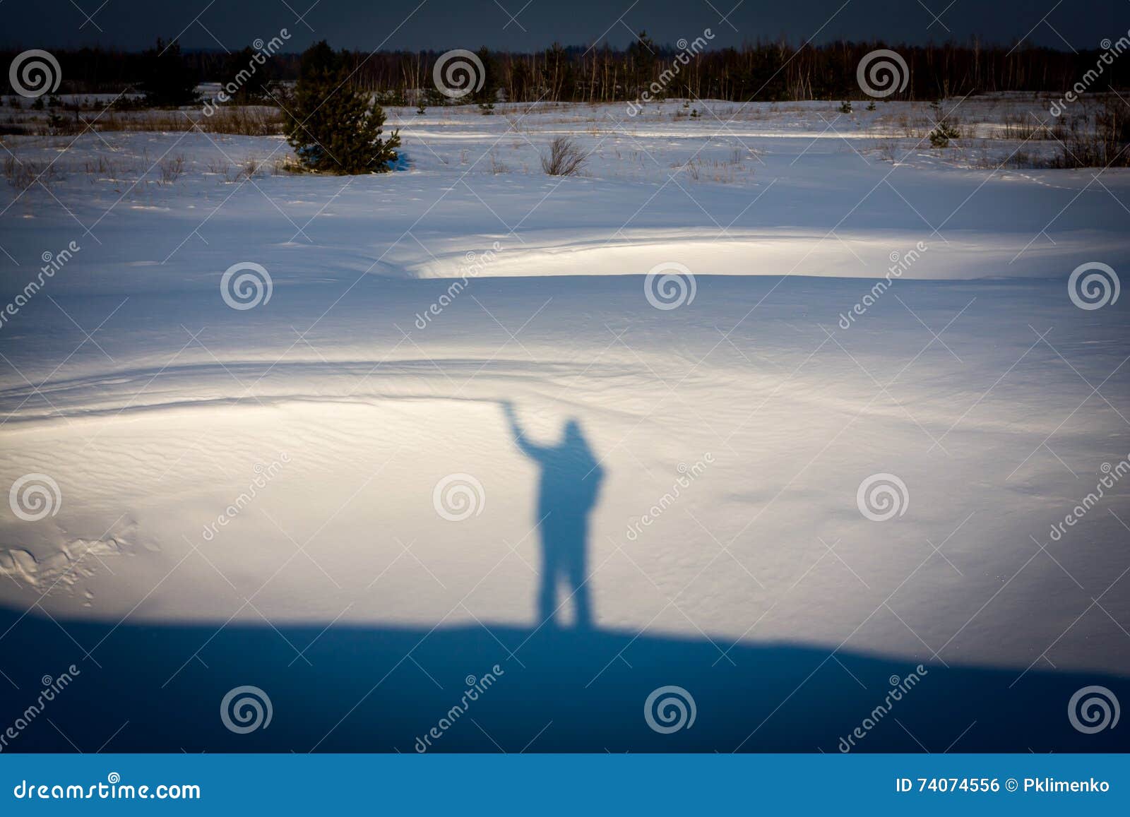 Man s shadow on snow stock photo. Image of clean, silhouette - 74074556