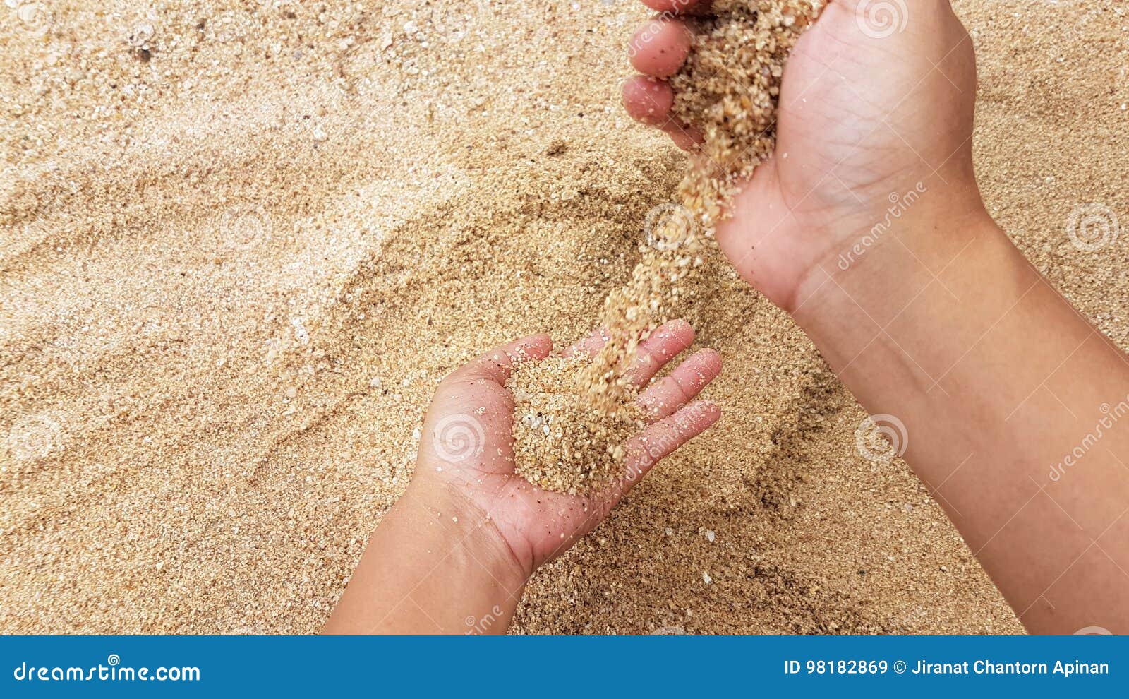 Man`s Upper Hand Throwing the Sand on Lower Hand Stock Image - Image of ...
