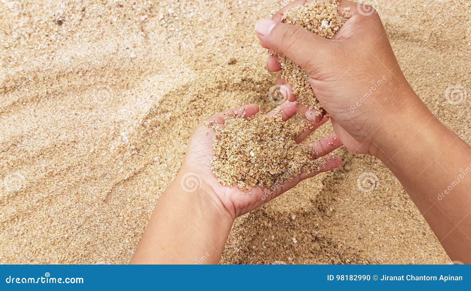Man`s Upper Hand Throwing the Sand on Lower Hand Stock Photo - Image of ...