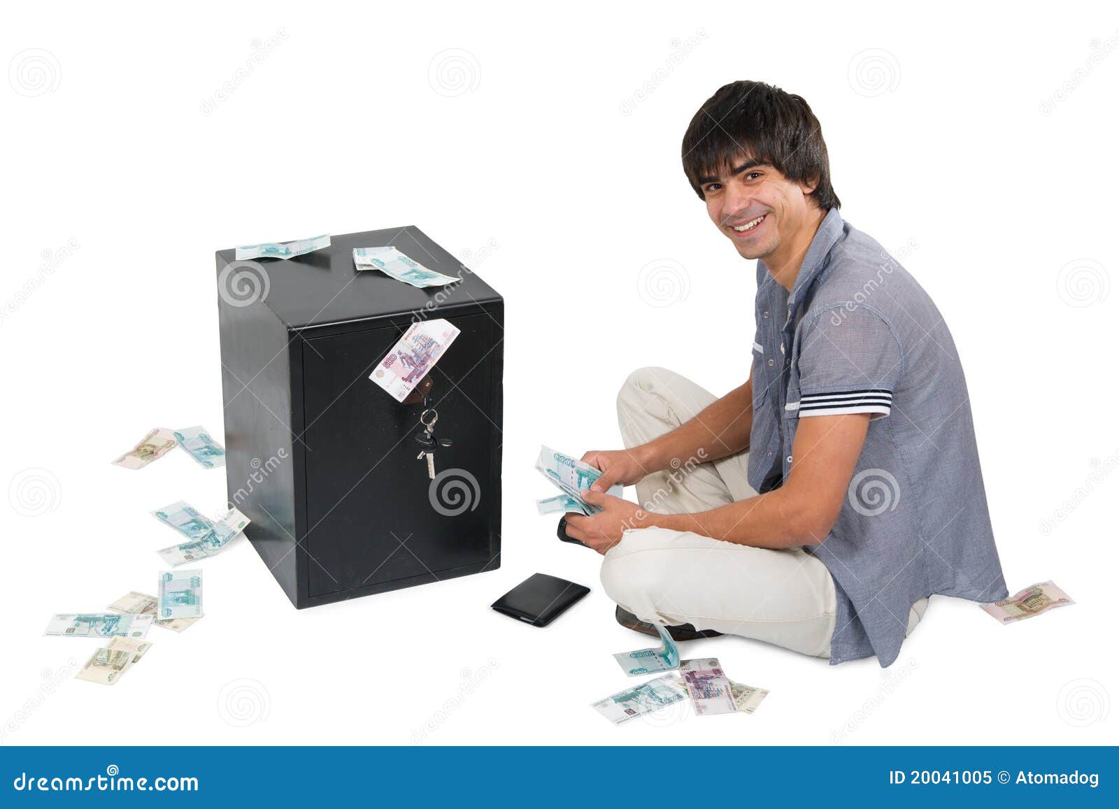 Man with safe and money stock image. Image of income - 20041005