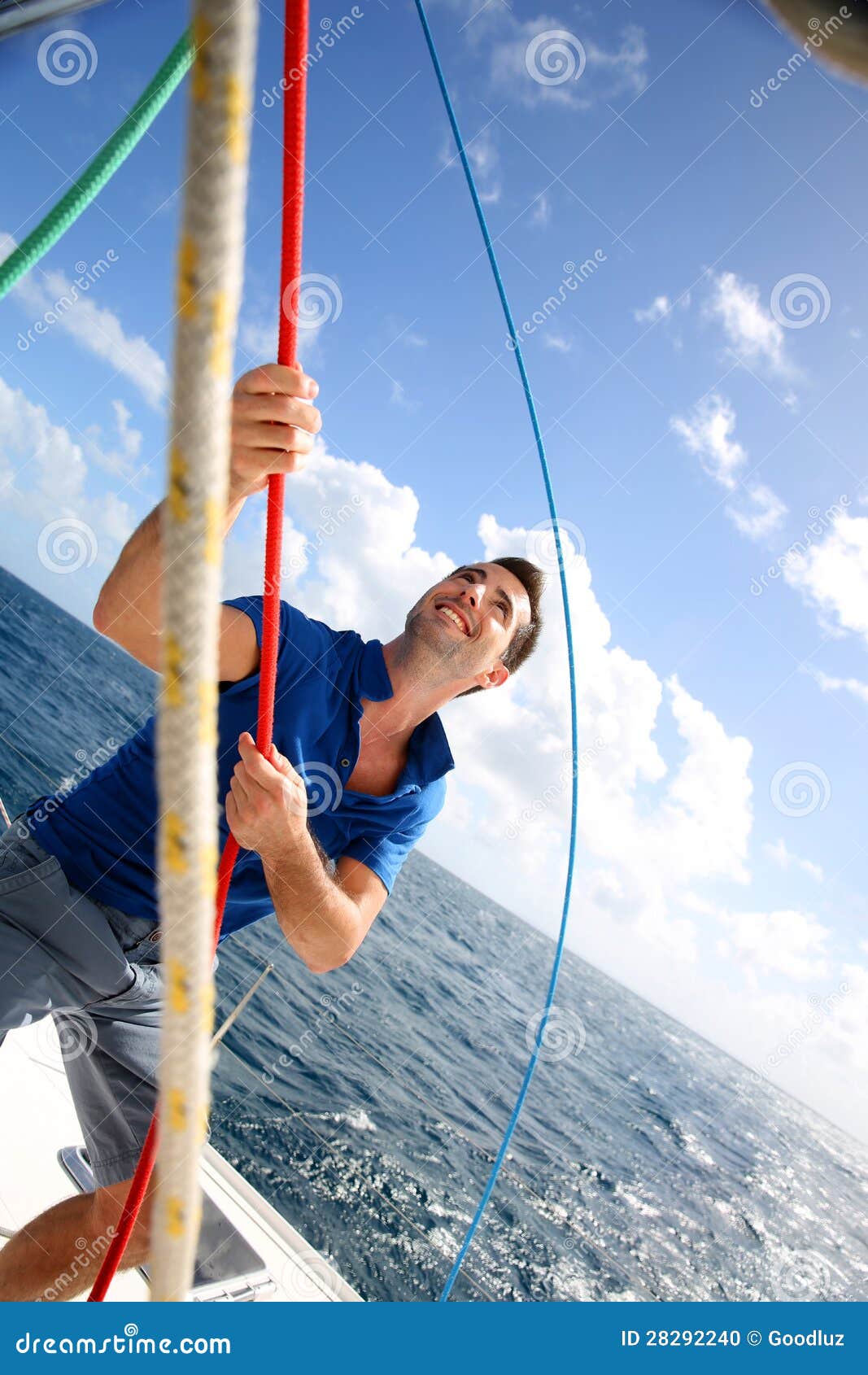 Man on sail boat stock photo. Image of sailing, raising - 28292240