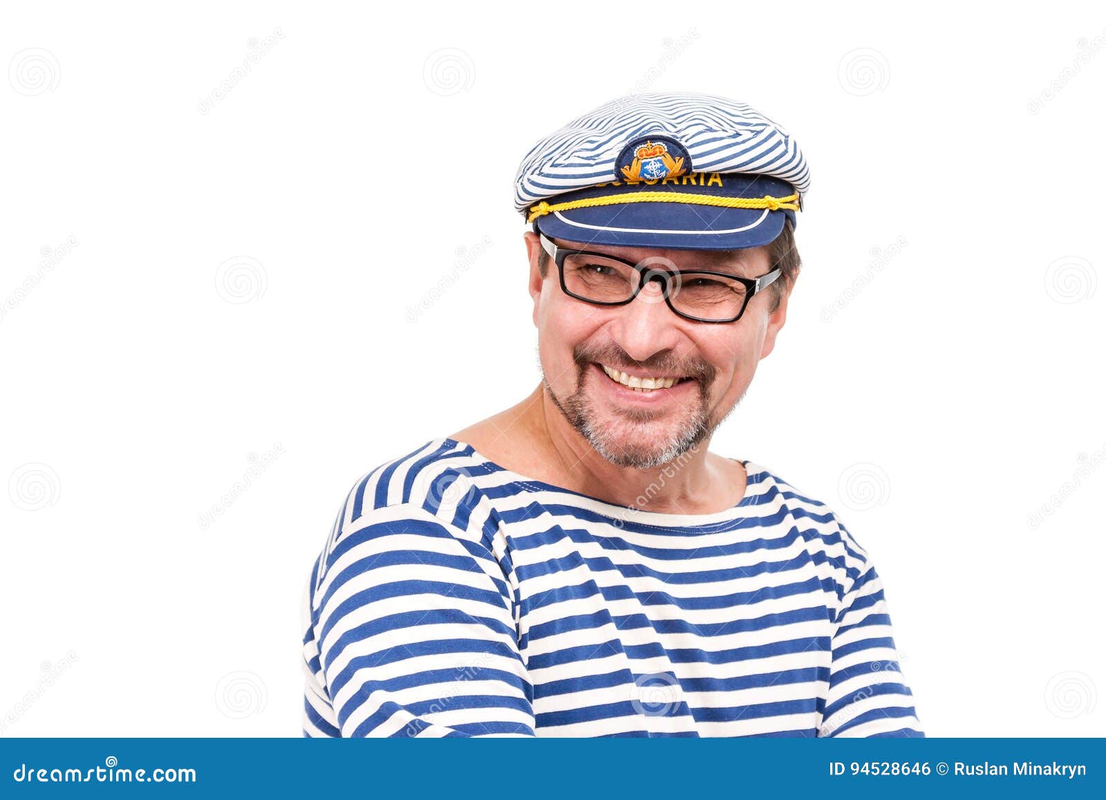 A Man Sailor in a Cap with a Smoking Pipe in Front of a White Ba Stock ...