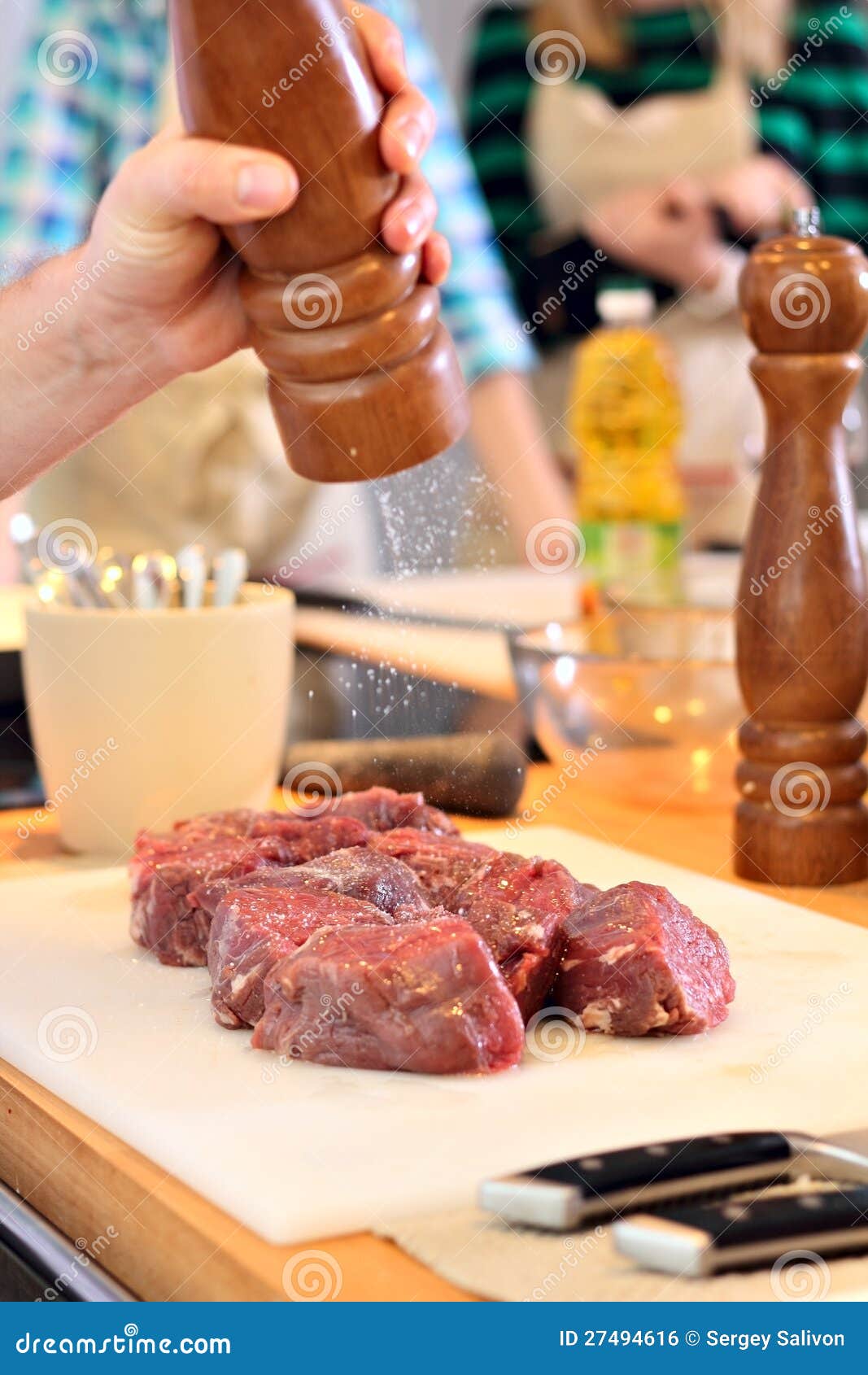 Man is salting a meat stock photo. Image of board, nutrition - 27494616