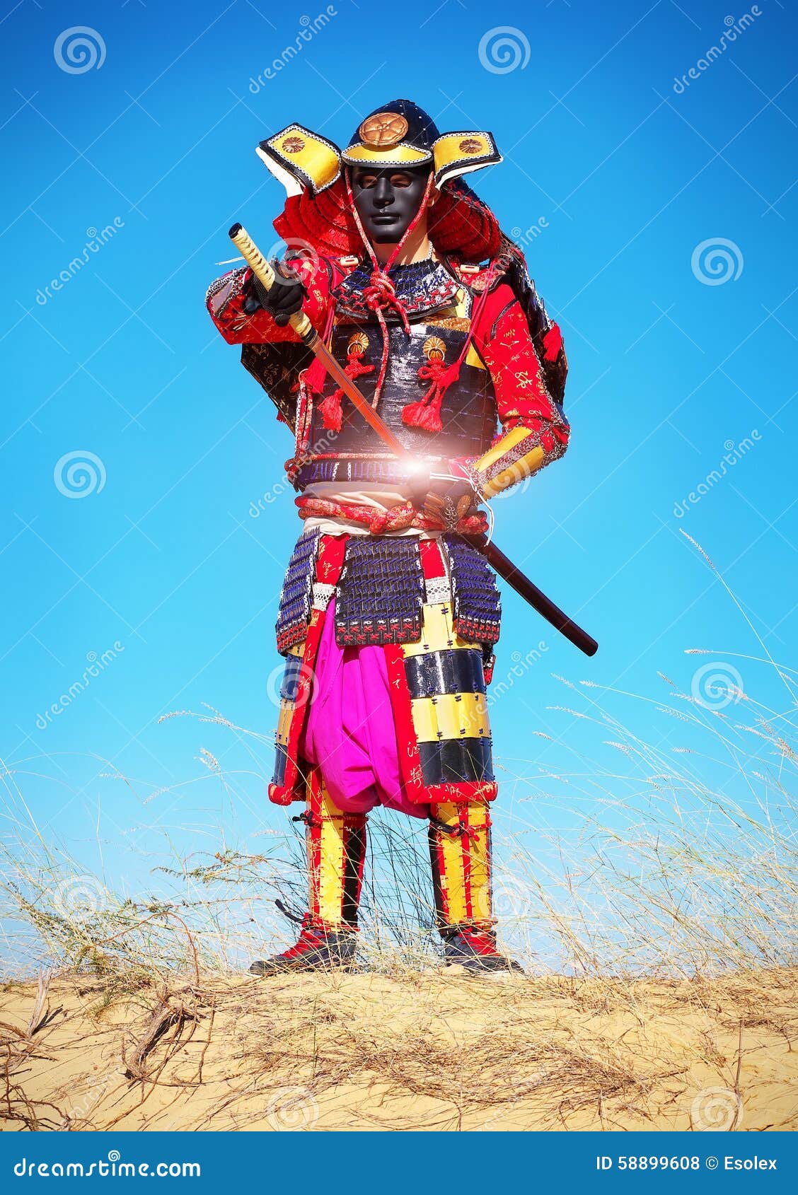 Man in Samurai Costume Pulls Out His Powerfull Hot Sword. Stock Photo ...