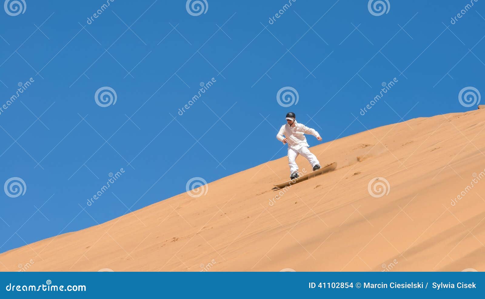 Man Sandboarding in Namibia Stock Photo - Image of enjoyment ...