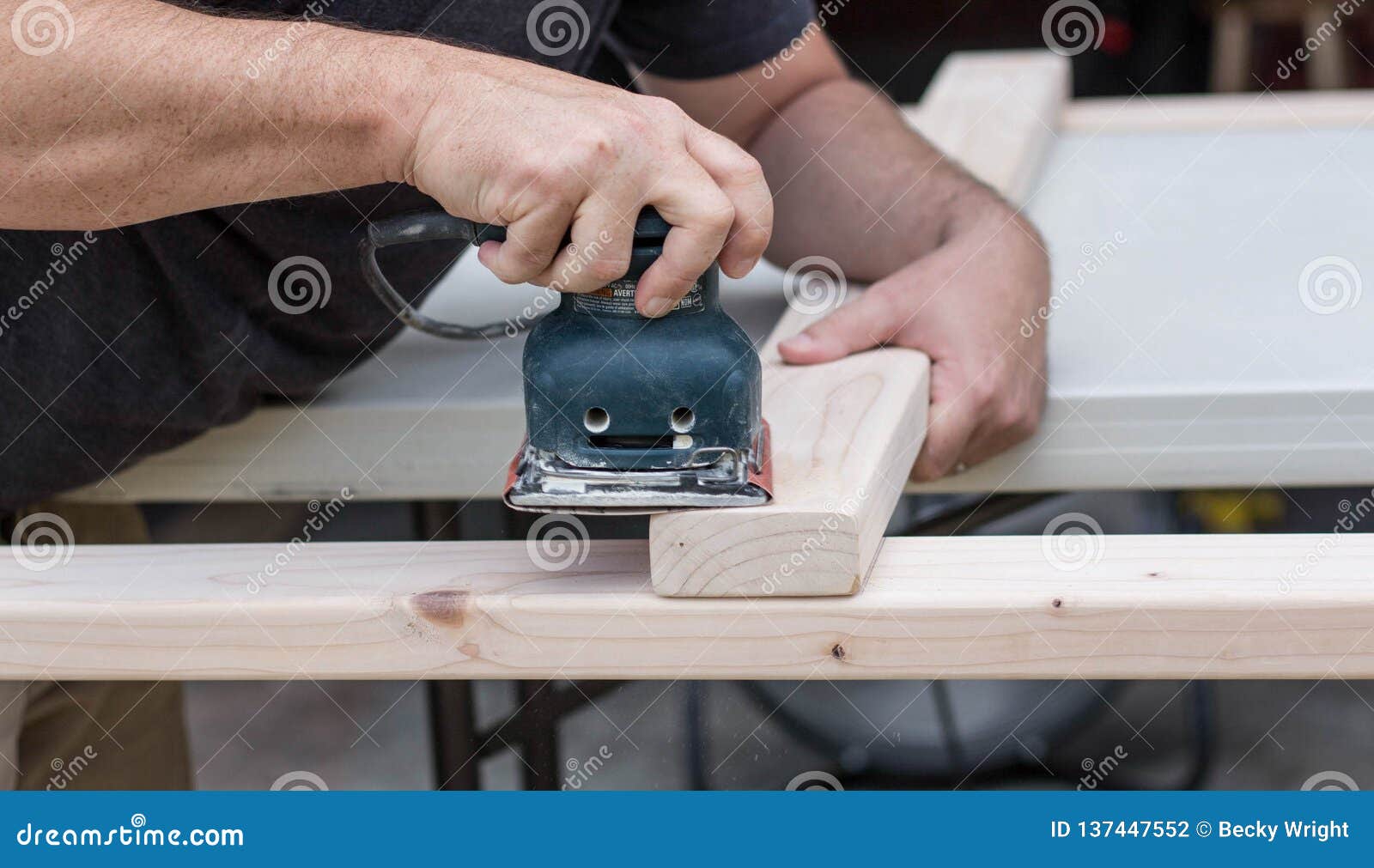 Man Sanding a DIY Project stock photo. Image of machine - 137447552
