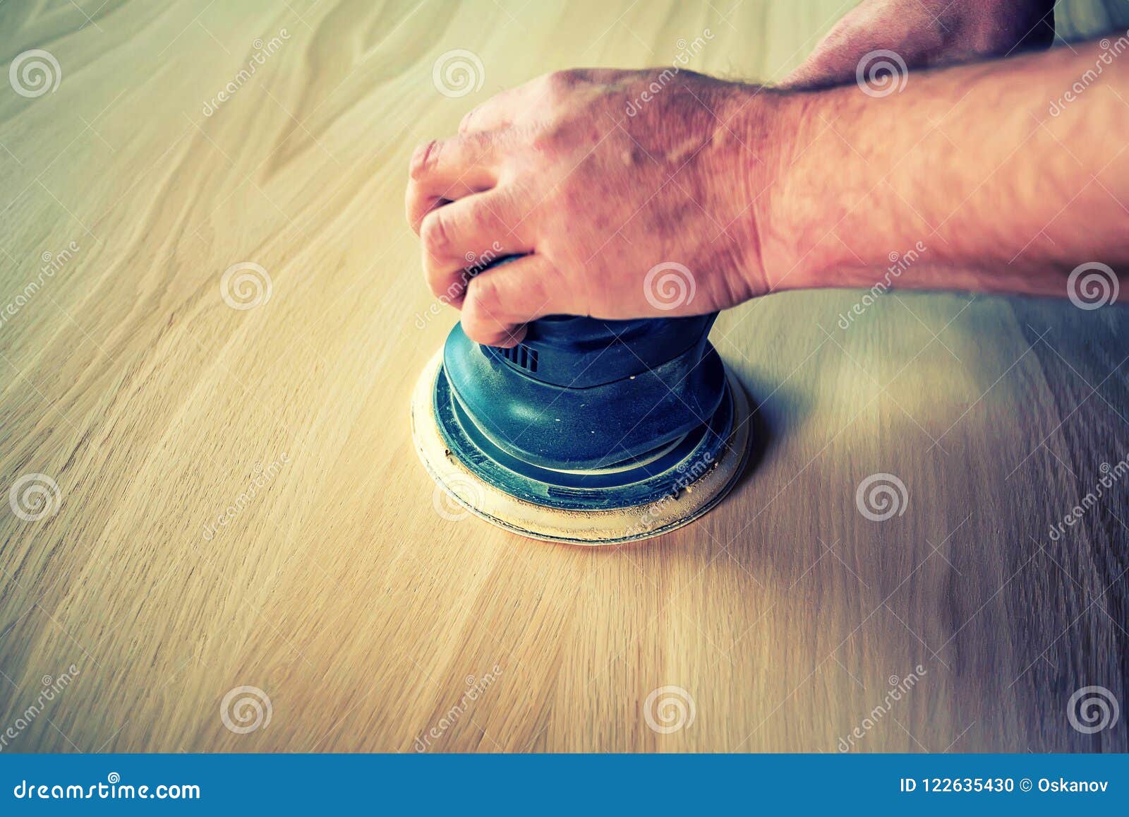 Man Sanding Wood with Orbital Sander in a Workshop Stock Photo - Image ...