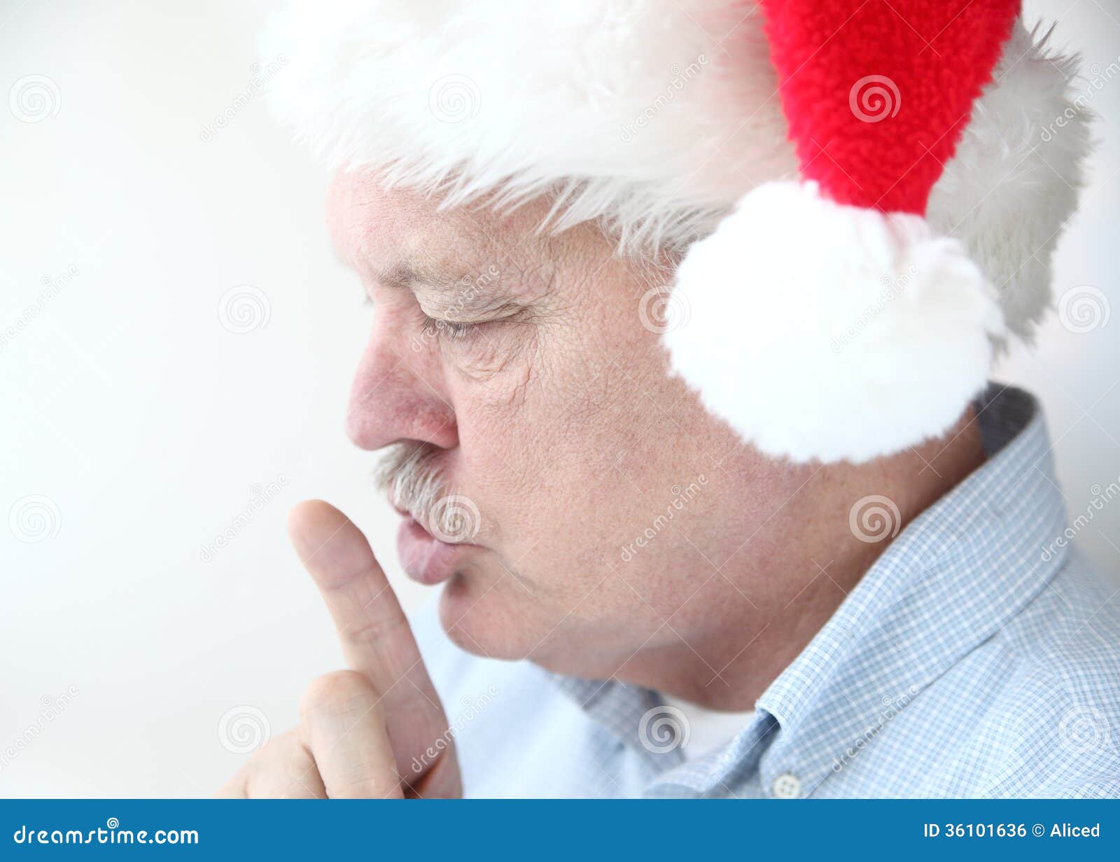 Man in Santa Hat with Hush Gesture Stock Photo - Image of santa, quiet ...
