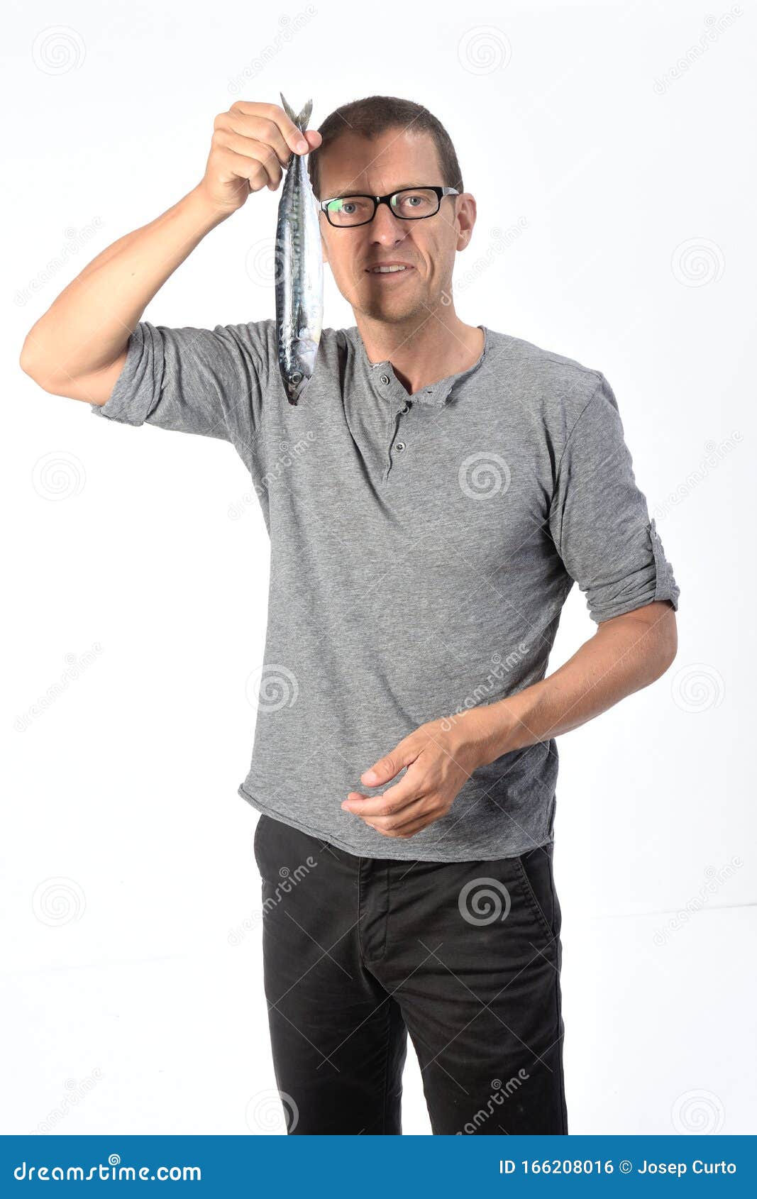Man with Sardine on White Background Stock Photo - Image of fresh, diet ...