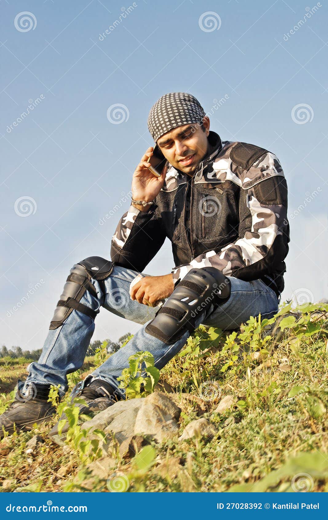 Man Sat at Roadside Using Cell Phone Stock Photo - Image of expressway ...