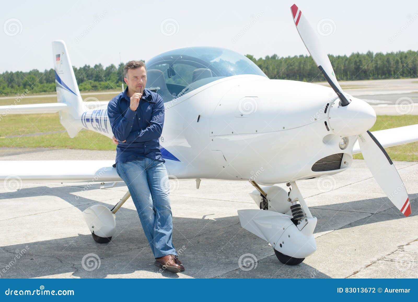 Man sat on wing aircraft stock photo. Image of aviation - 83013672