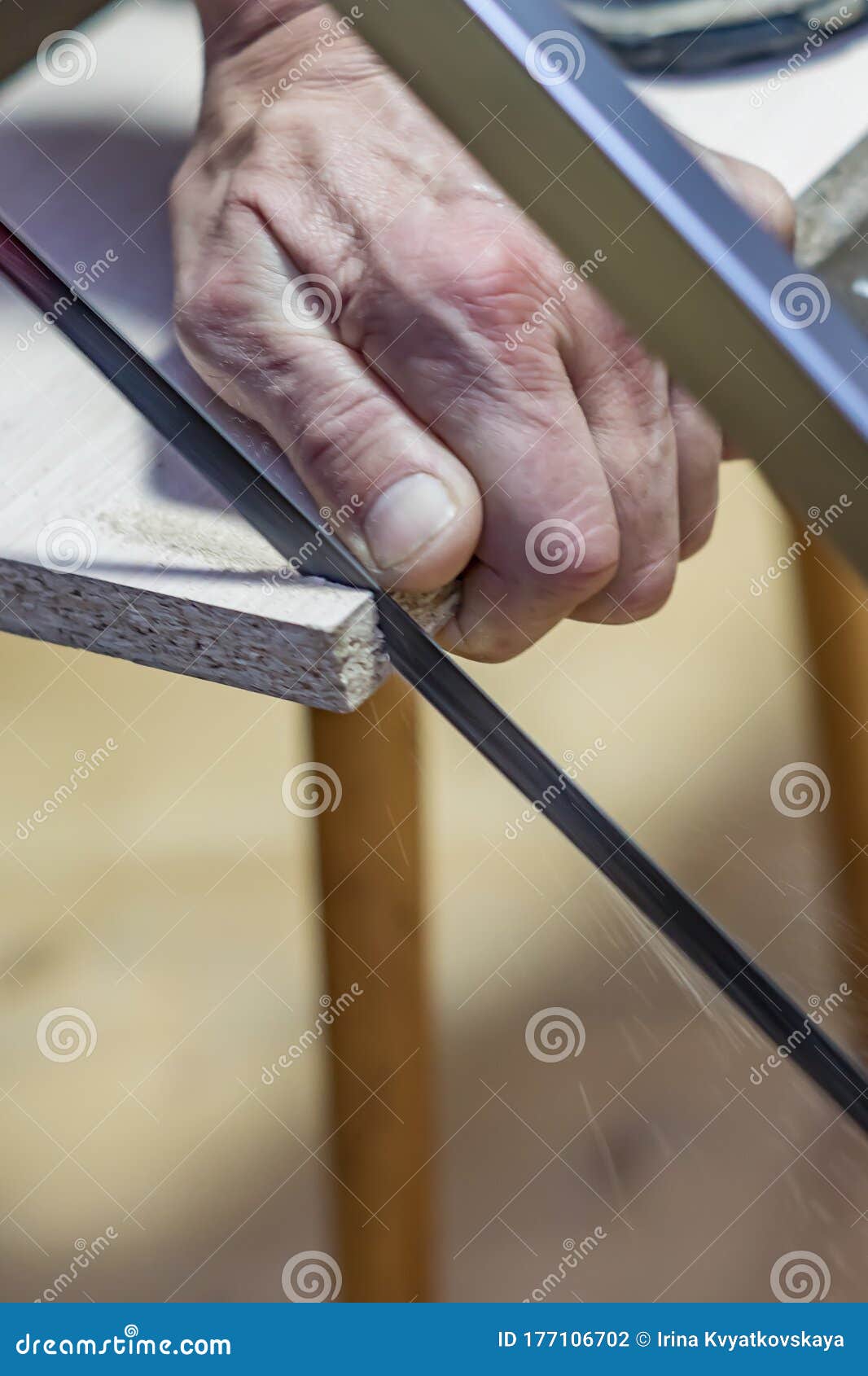 Man Sawing a Board with a Hacksaw Stock Photo - Image of construction ...