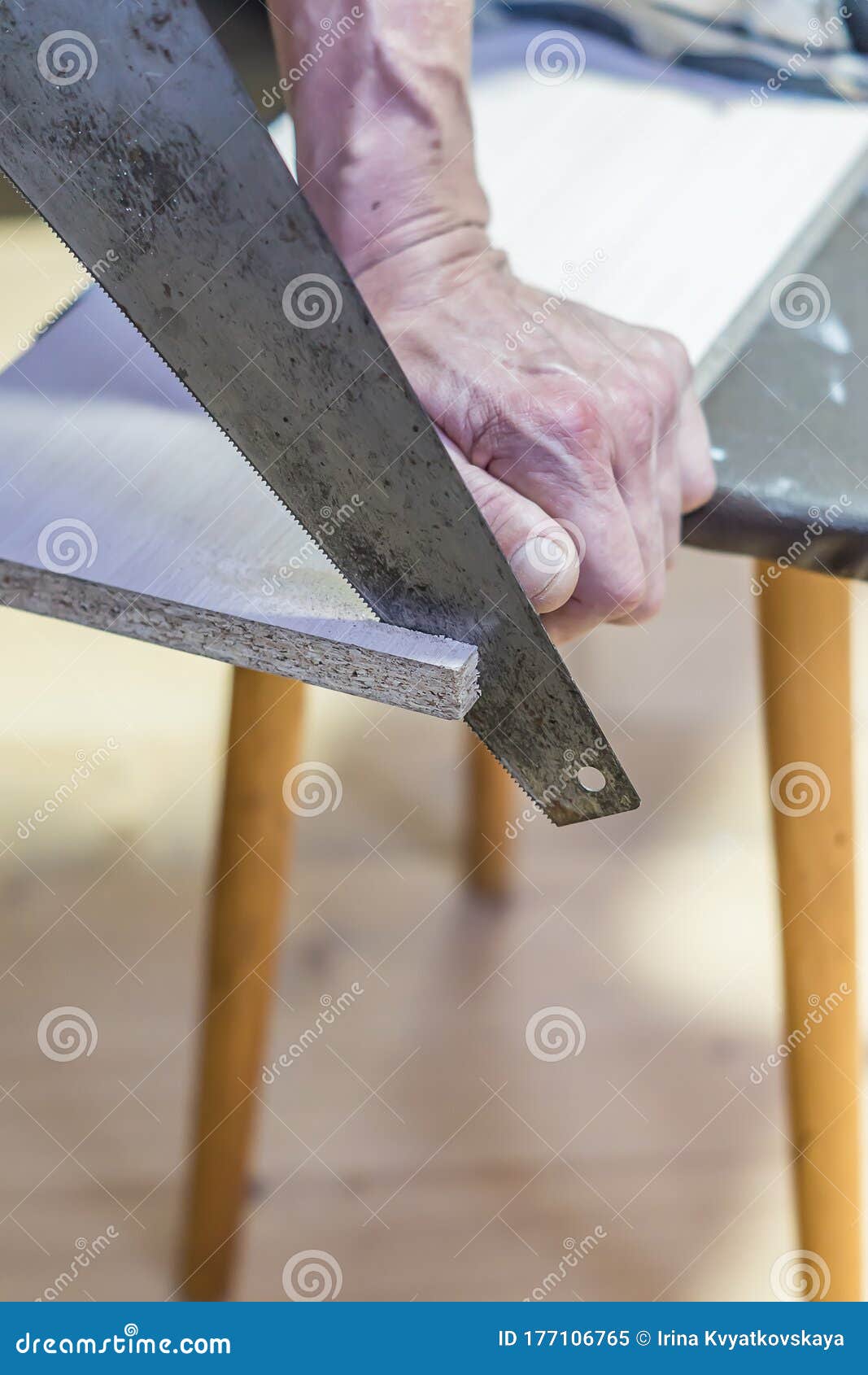 Man Sawing a Board with a Hacksaw Stock Image - Image of sharp, person ...