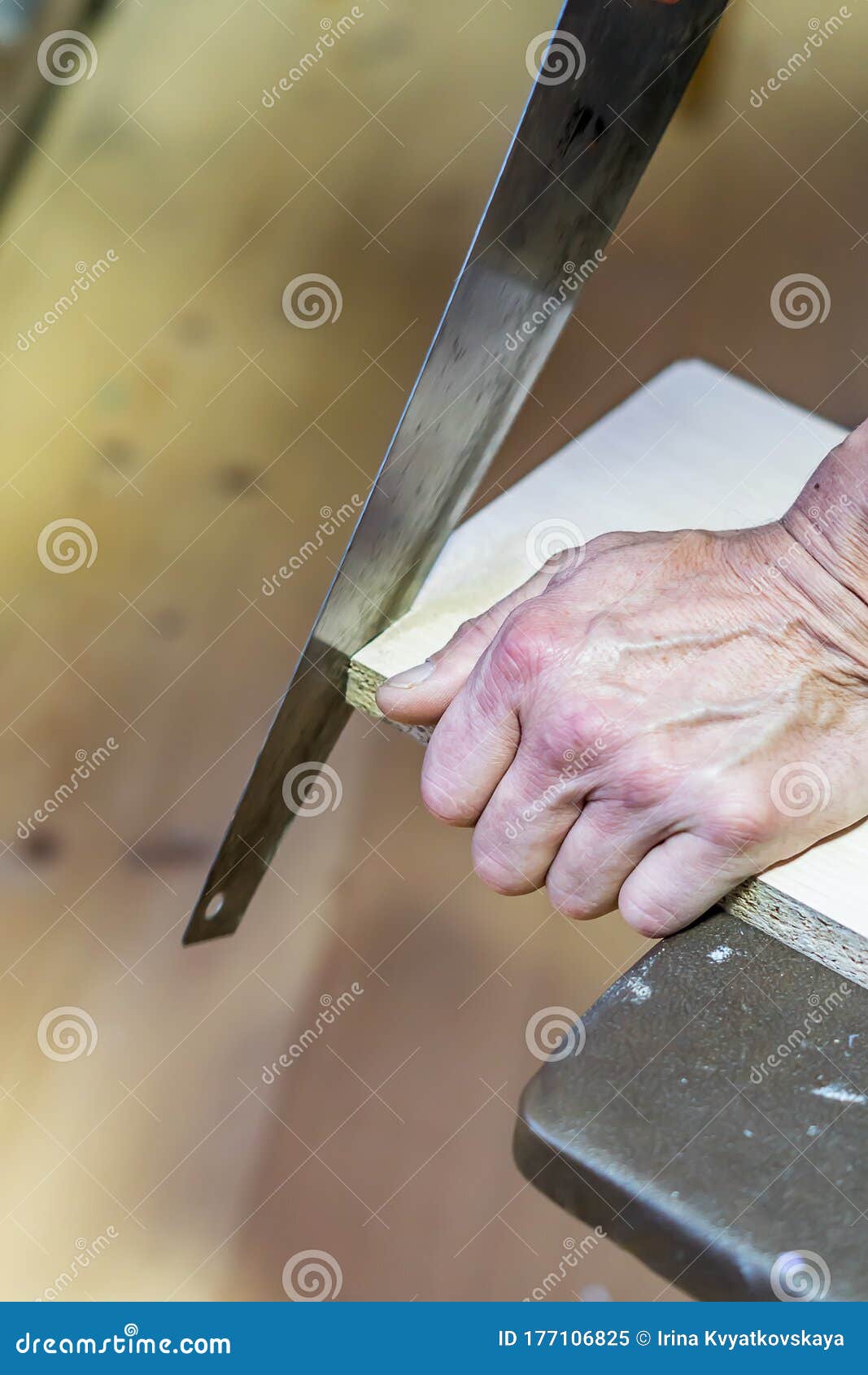 Man Sawing a Board with a Hacksaw Stock Image - Image of wood ...