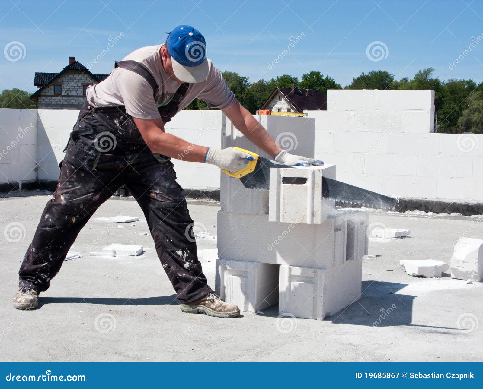 Man sawing concrete block stock image. Image of manually - 19685867