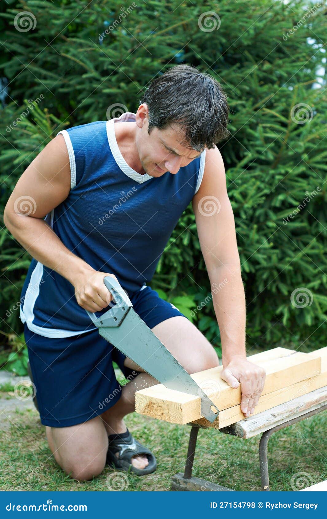 Man sawing wood stock photo. Image of carpenter, craftsman - 27154798