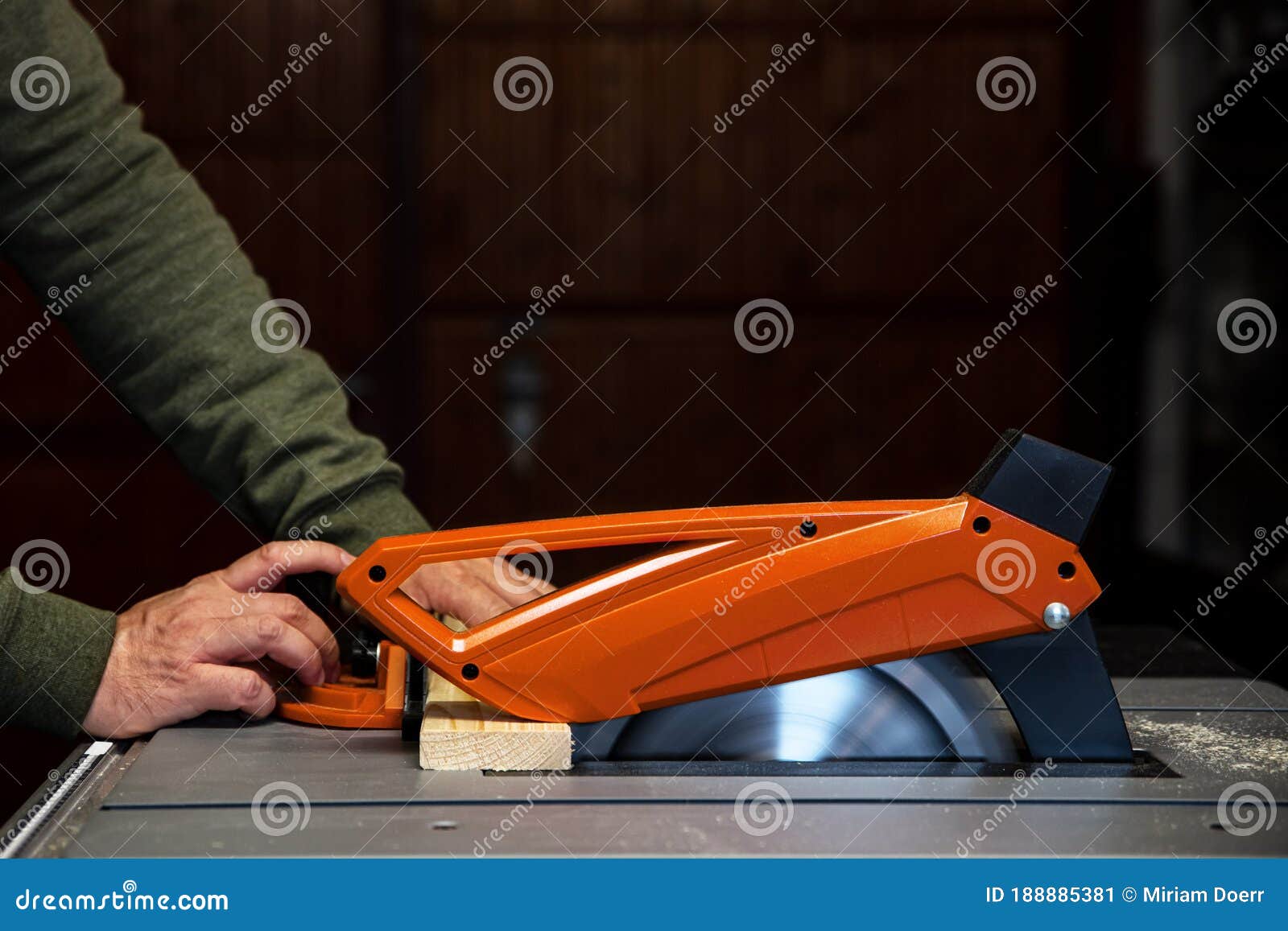 A Man is Sawing Wood on a Circular Table Saw Stock Image - Image of ...