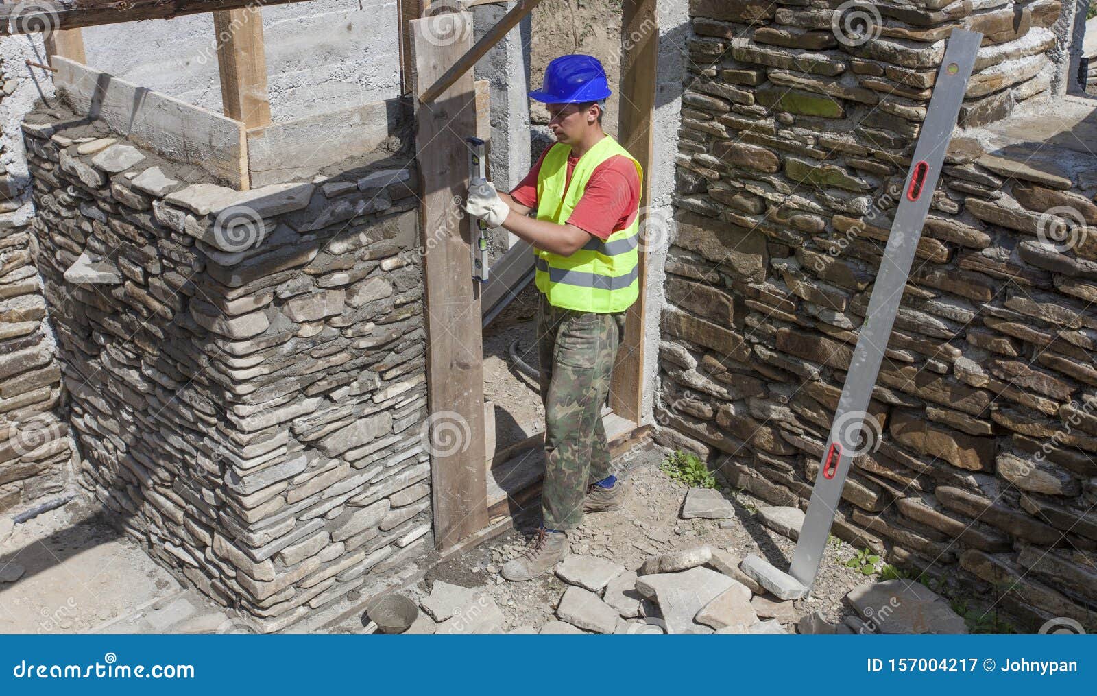 Man with Scales Tool for Basement Construction Stock Image - Image of ...
