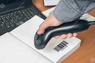 Man with Scanner Scans Barcode Stock Image - Image of light, digital ...