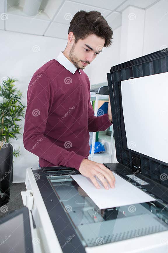 Man scanning a document stock image. Image of copy, student - 117484069