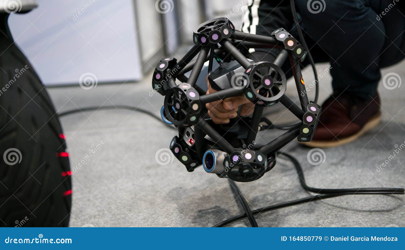 Man Scanning a Motorcycle Using a Measuring Machine 3D Scan High ...